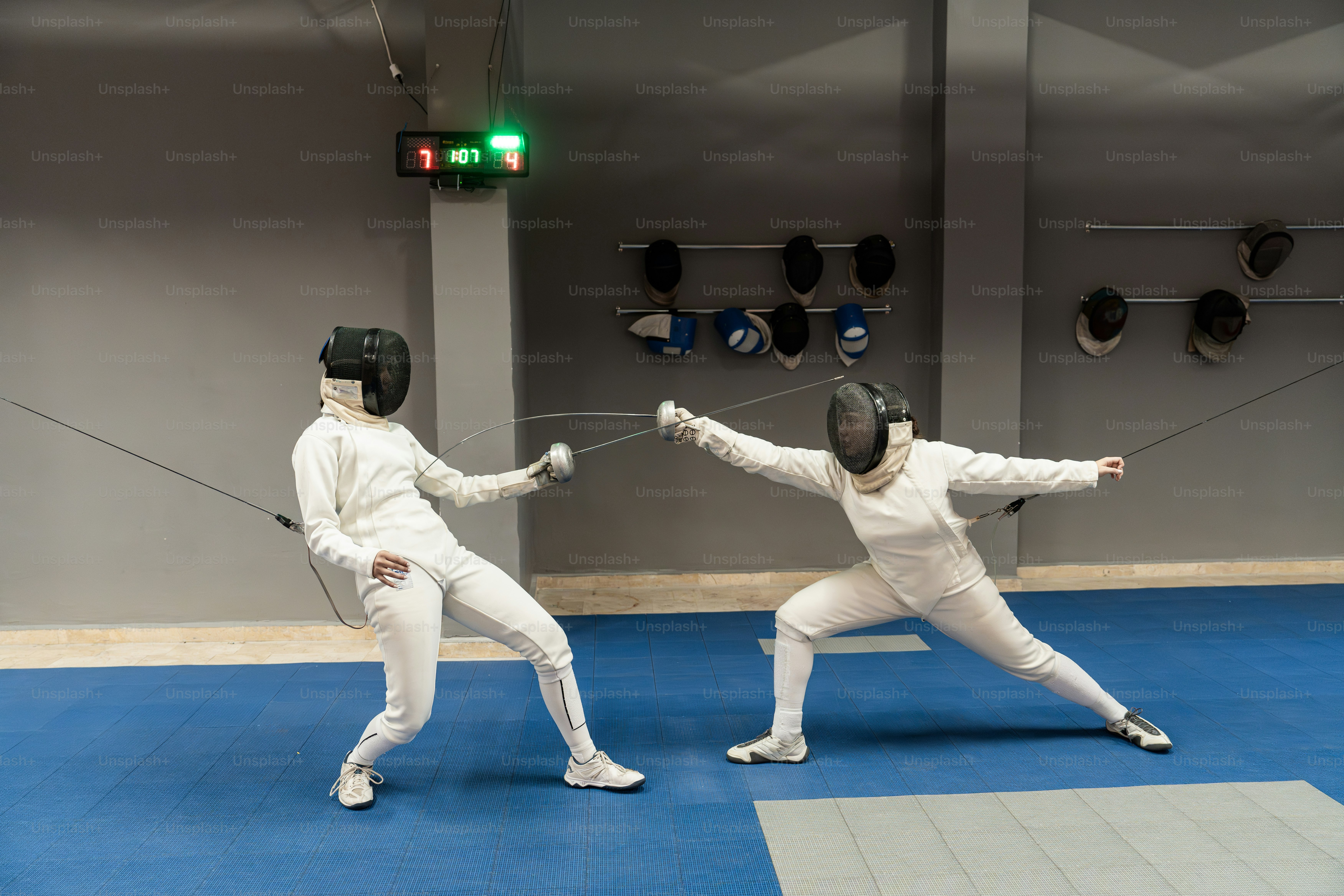 A couple of men in white fencing suits photo – Sports Image on Unsplash
