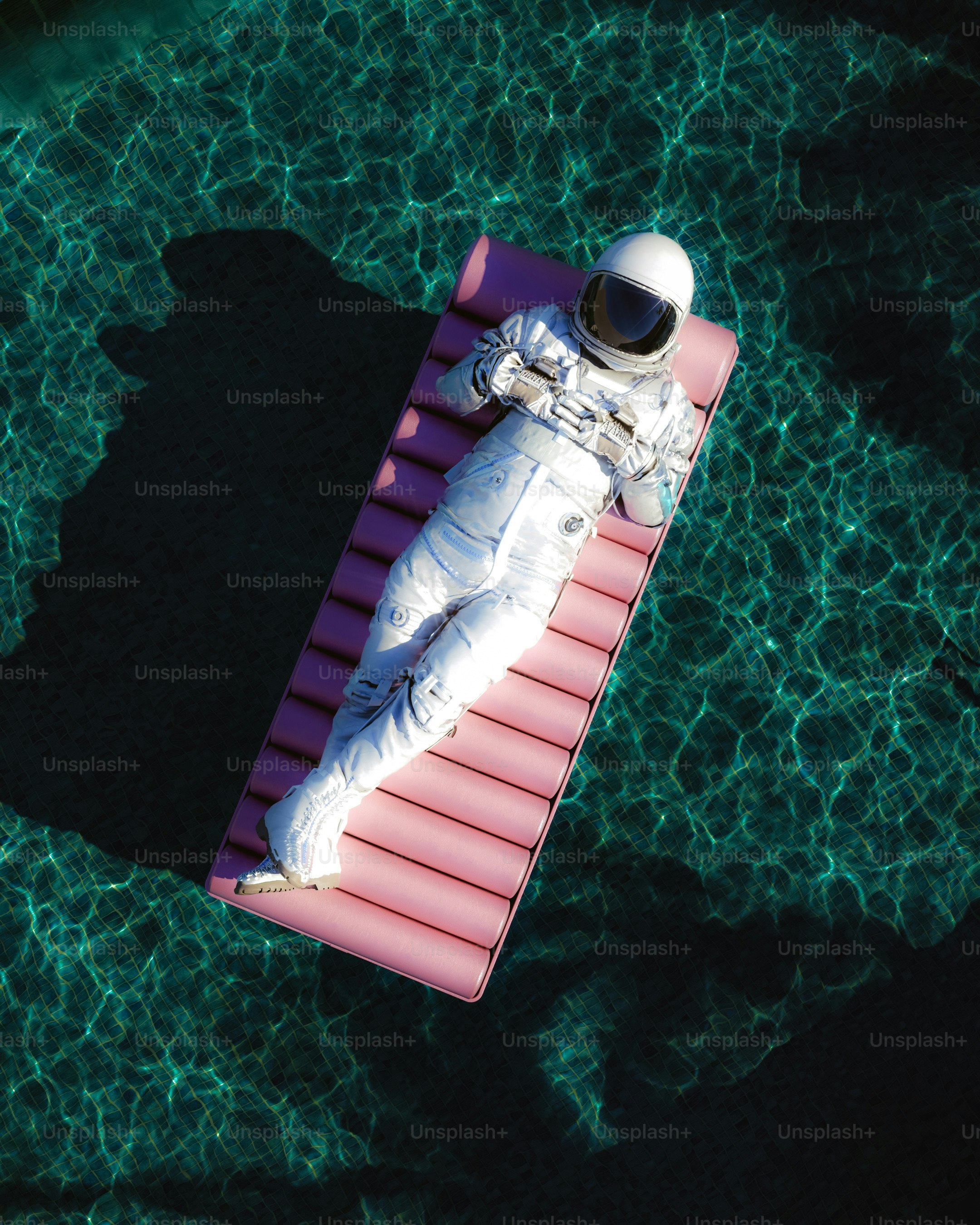 An astronaut floating on a floating bed in the water photo – 3d Image ...