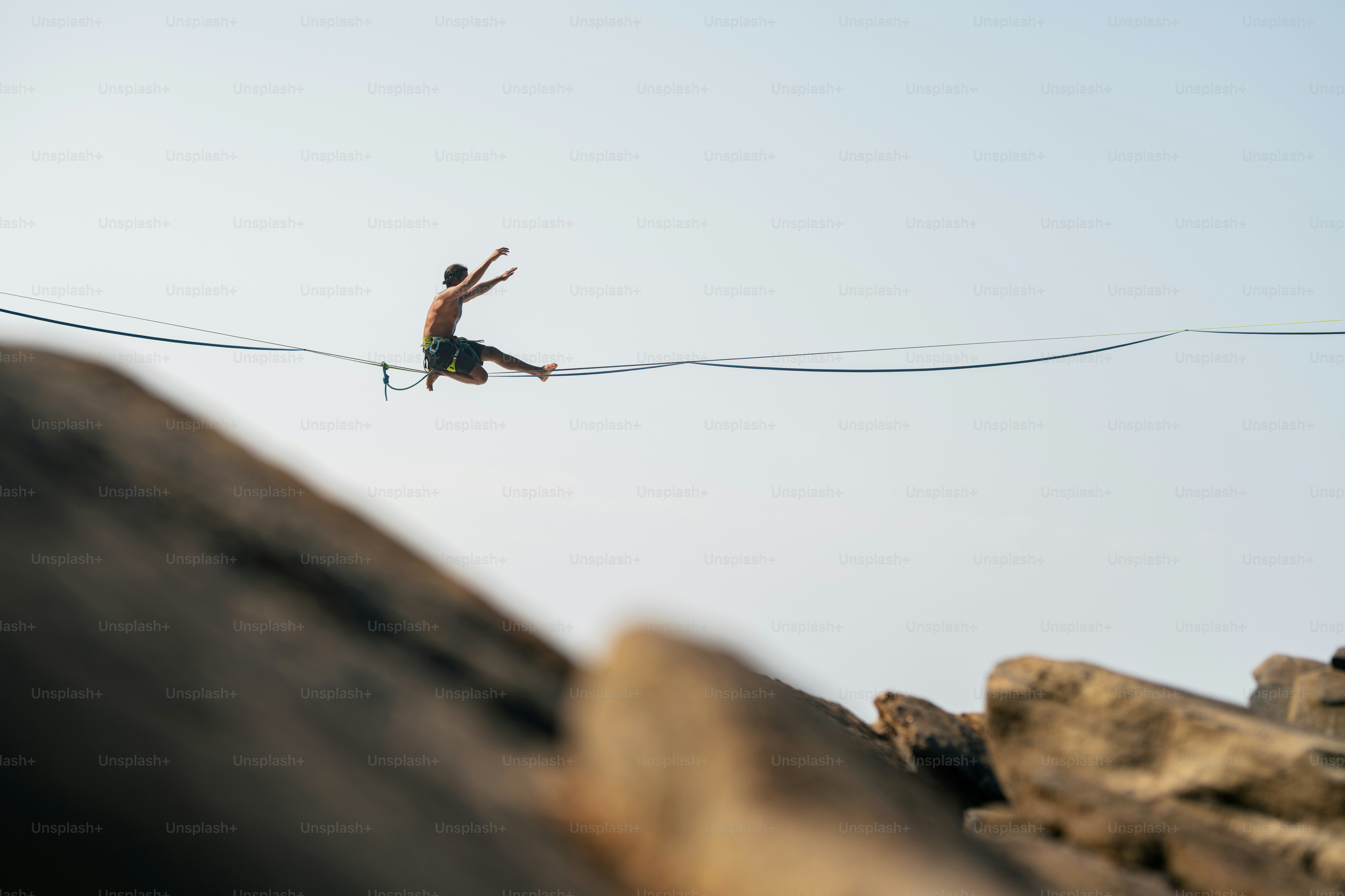 A man on a tightrope high in the air photo – Outdoor Image on Unsplash