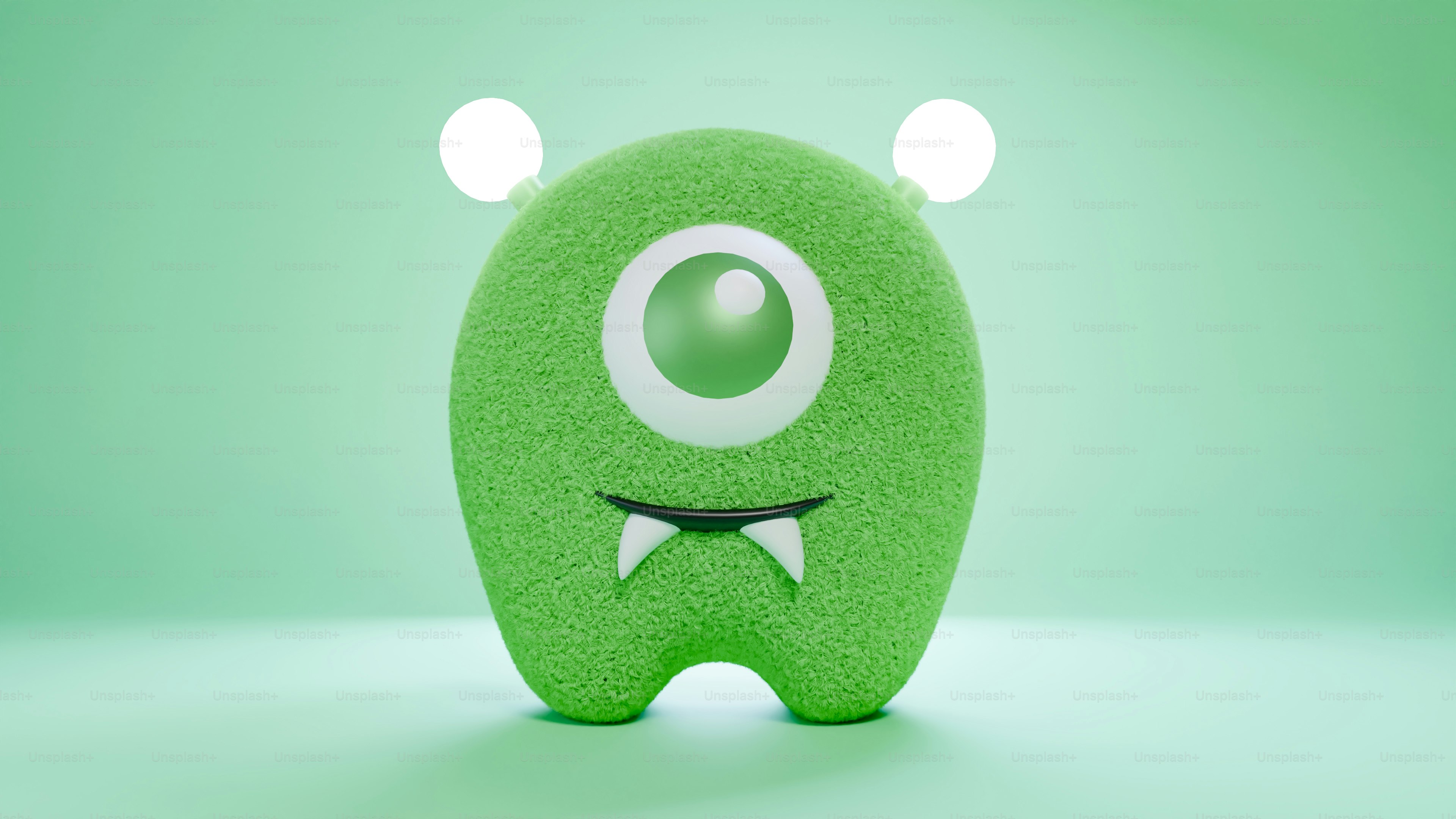 A green toy with a bow tie on it photo – Alien Image on Unsplash