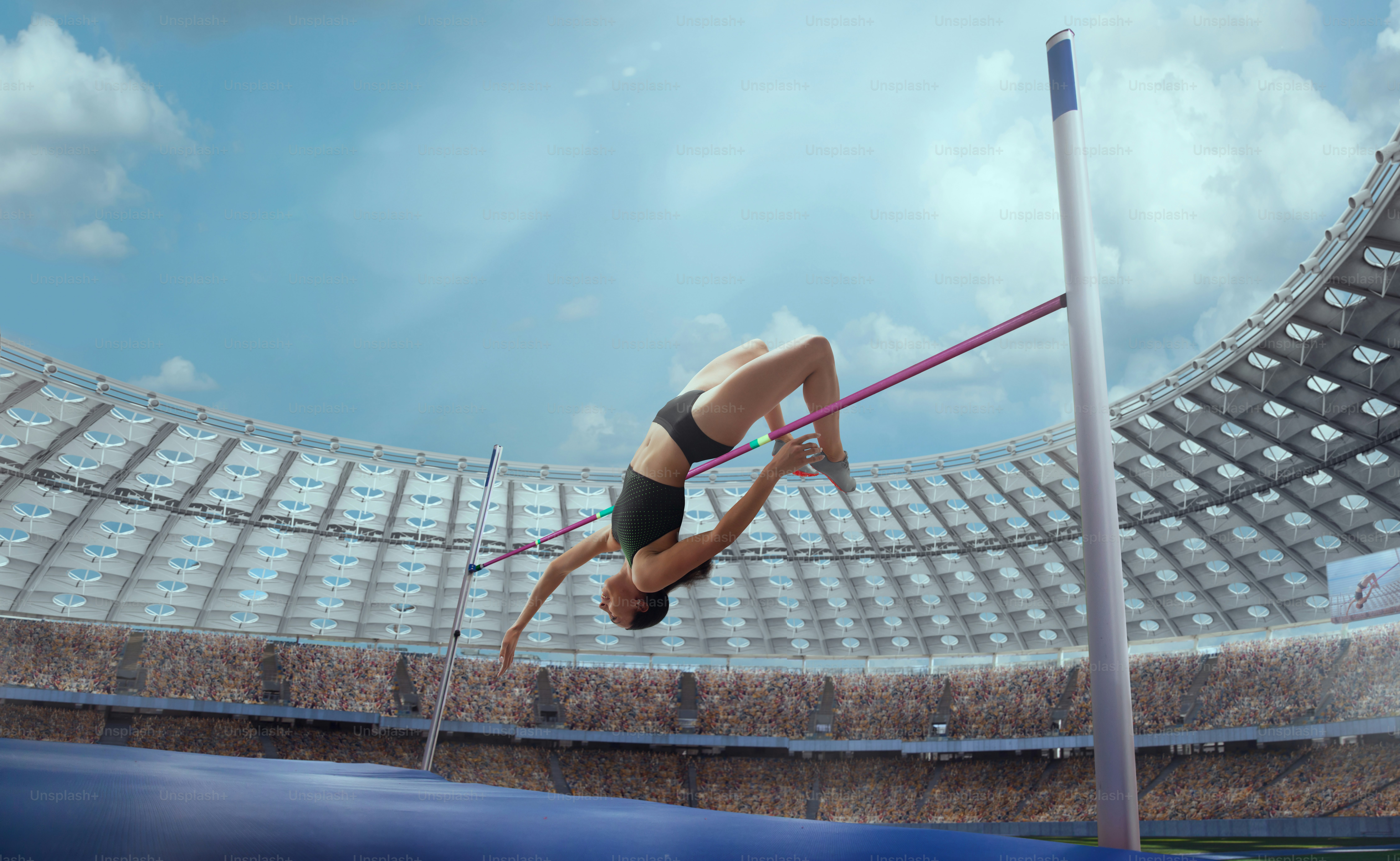 Athlete woman makes a high jump on sport championship. photo – Running ...