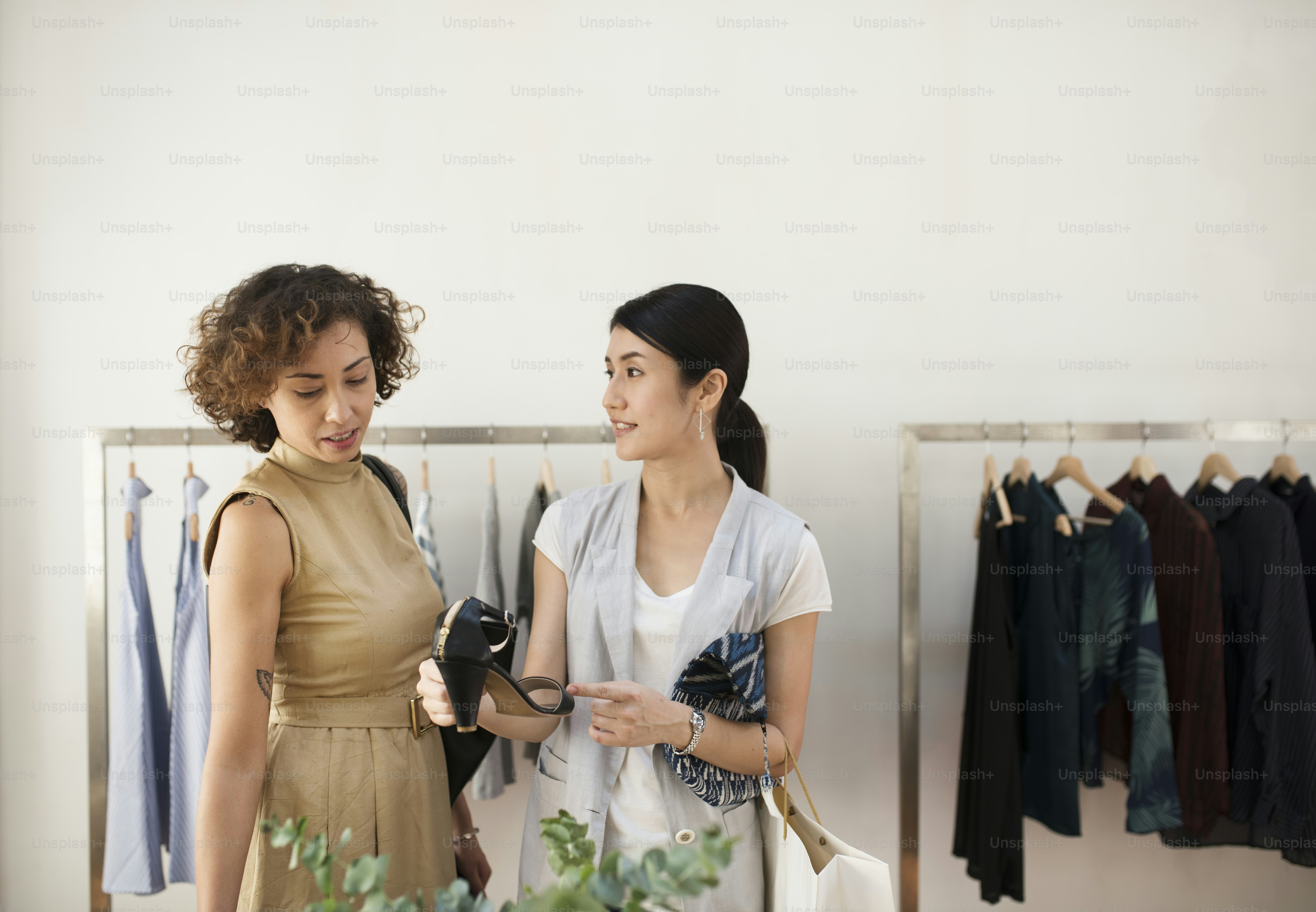 Customers checking out the shop photo – Buying Image on Unsplash