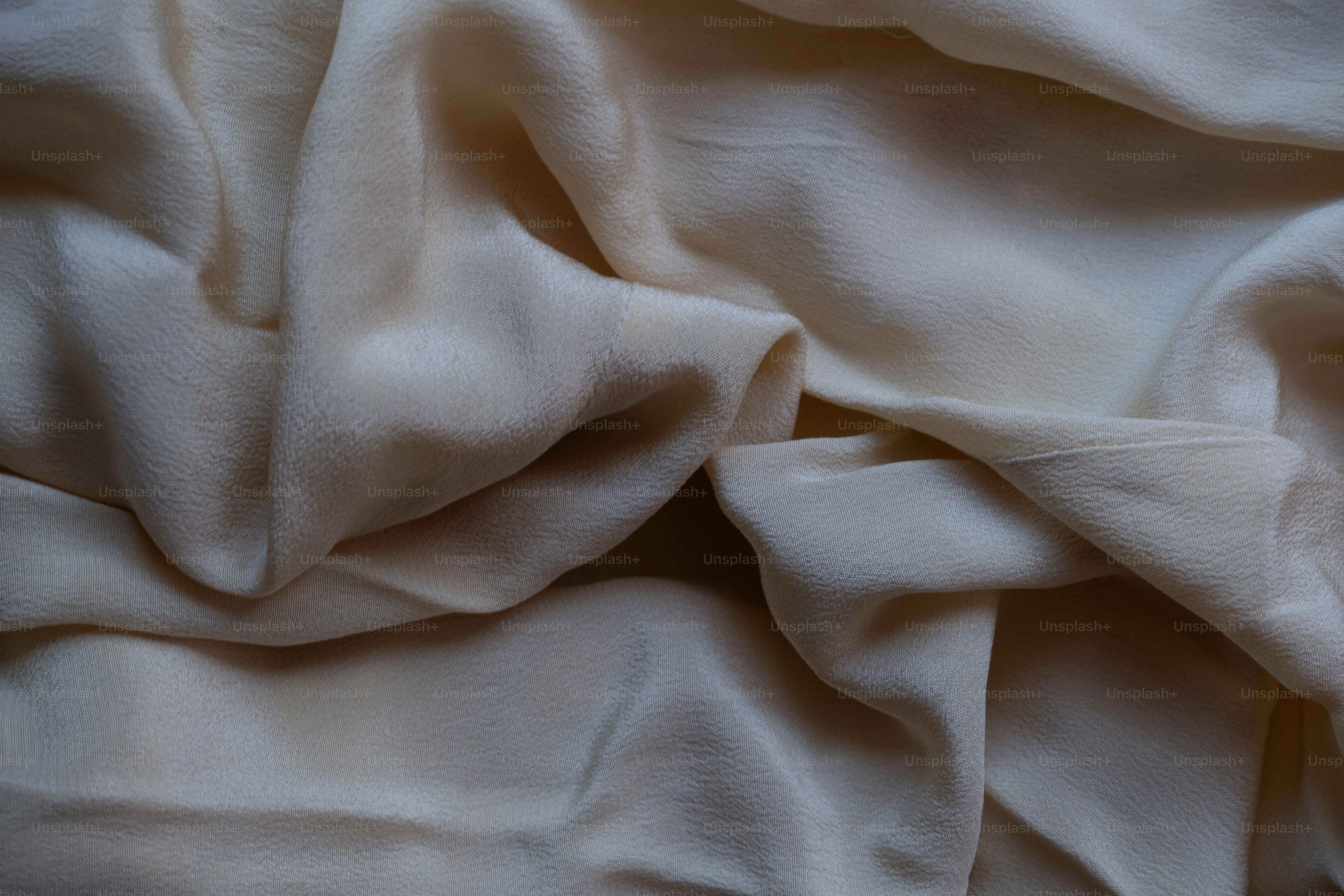 A close up view of a white fabric photo – Interior design Image on Unsplash
