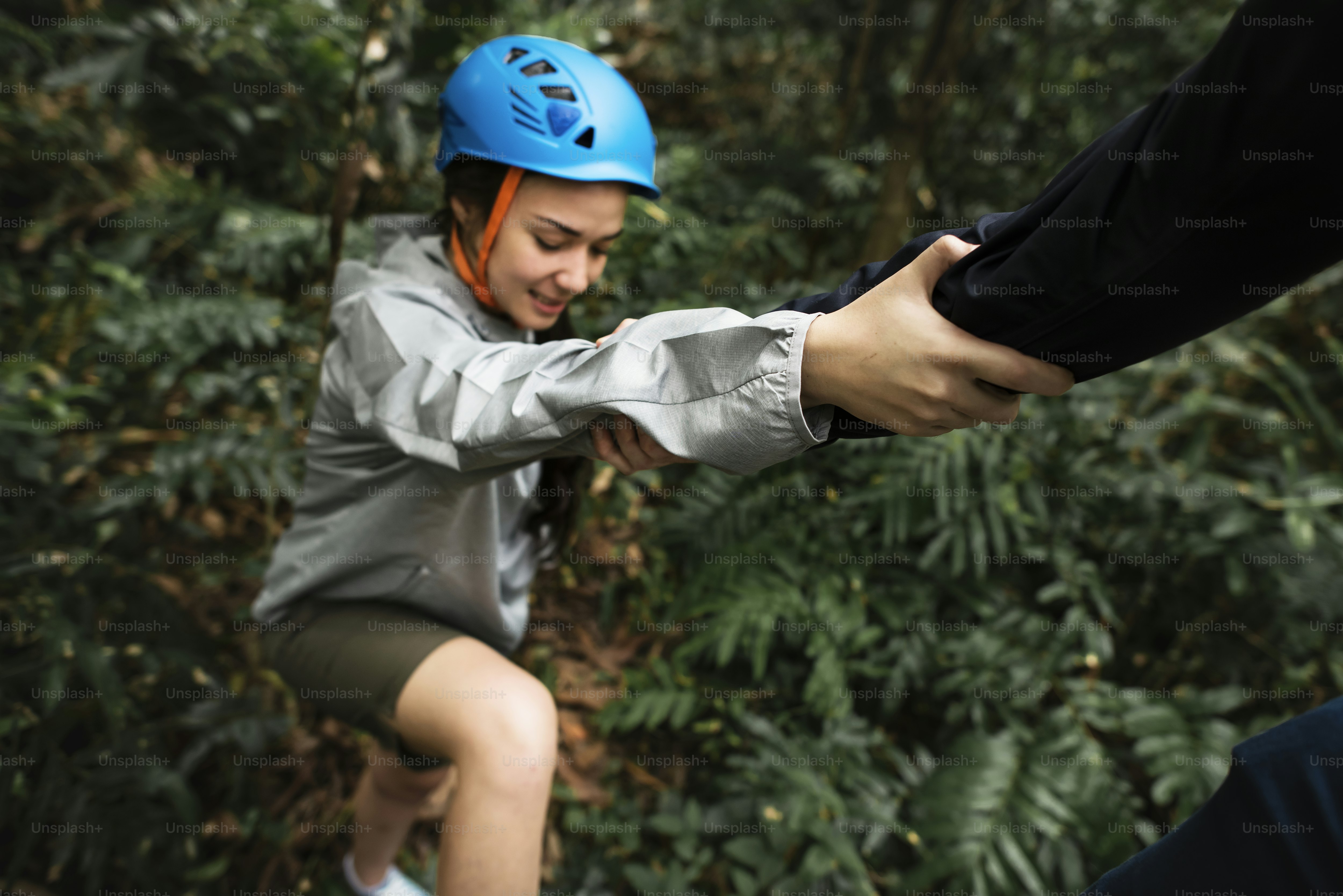 Hand holding hand helping photo – Forest Image on Unsplash