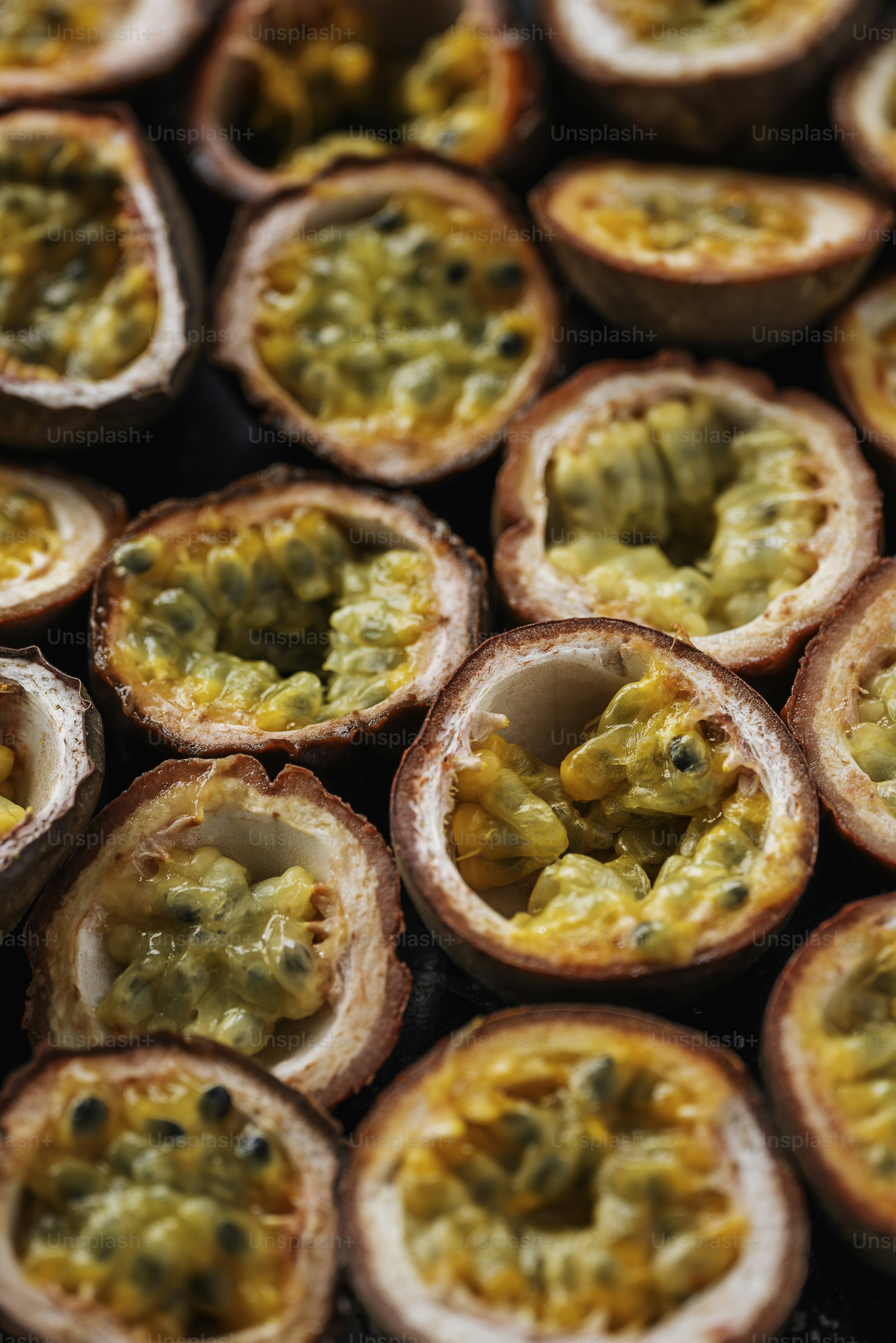 A bunch of food that is inside of a bowl photo – Passion fruits Image ...