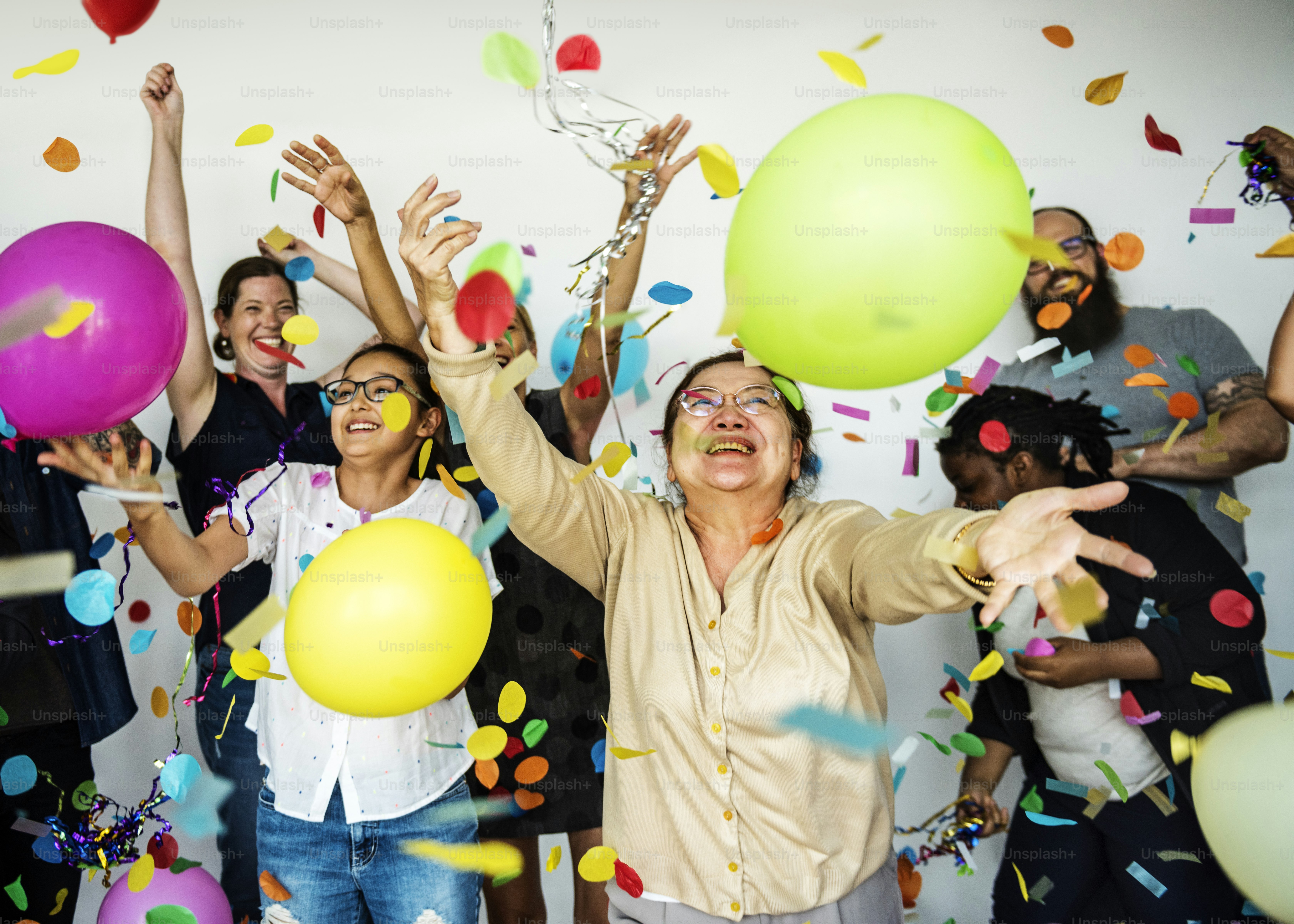 Group of Diverse People with Party Balloons Confetti photo ...