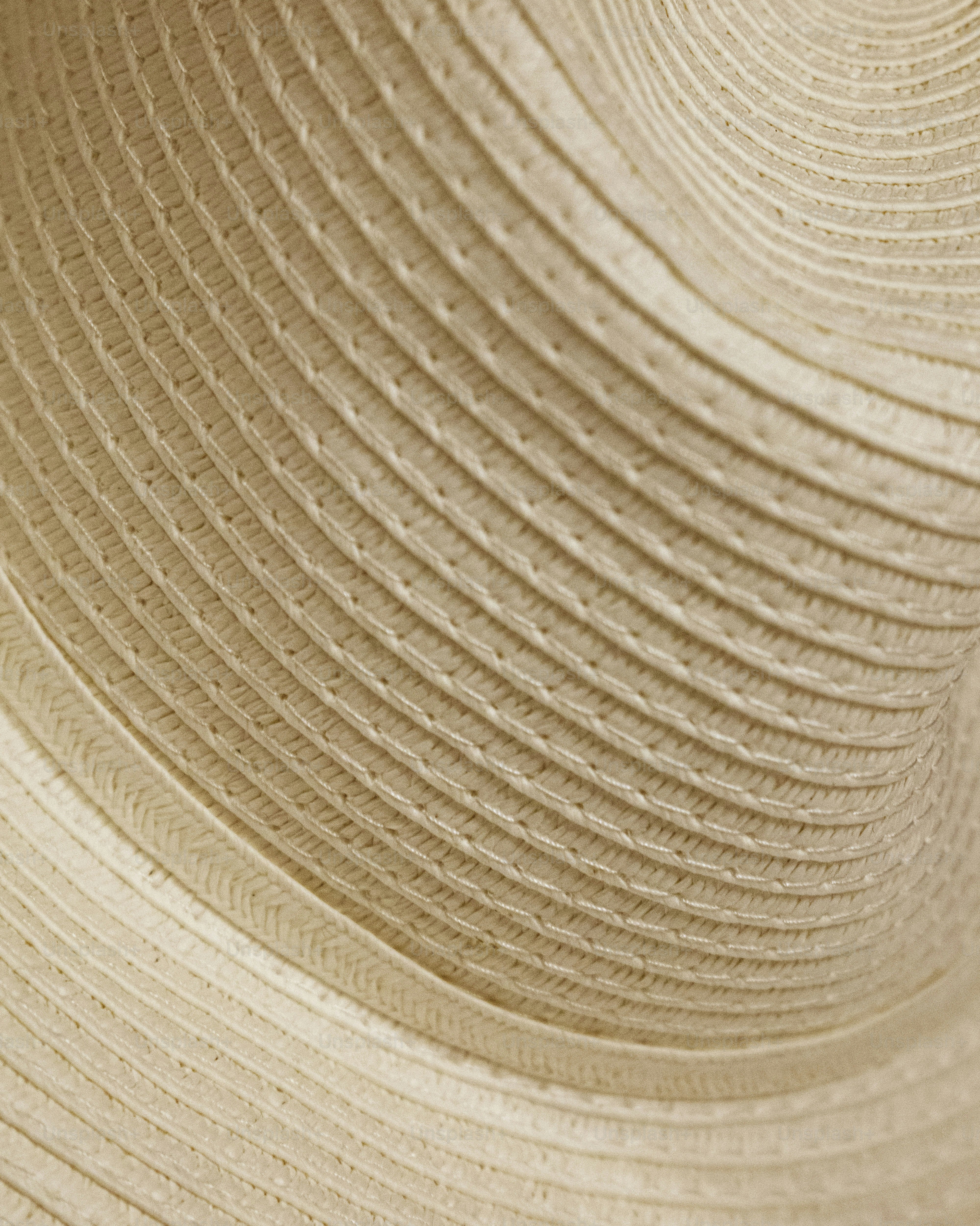 A close up view of a straw hat photo – Neutral aesthetic Image on Unsplash
