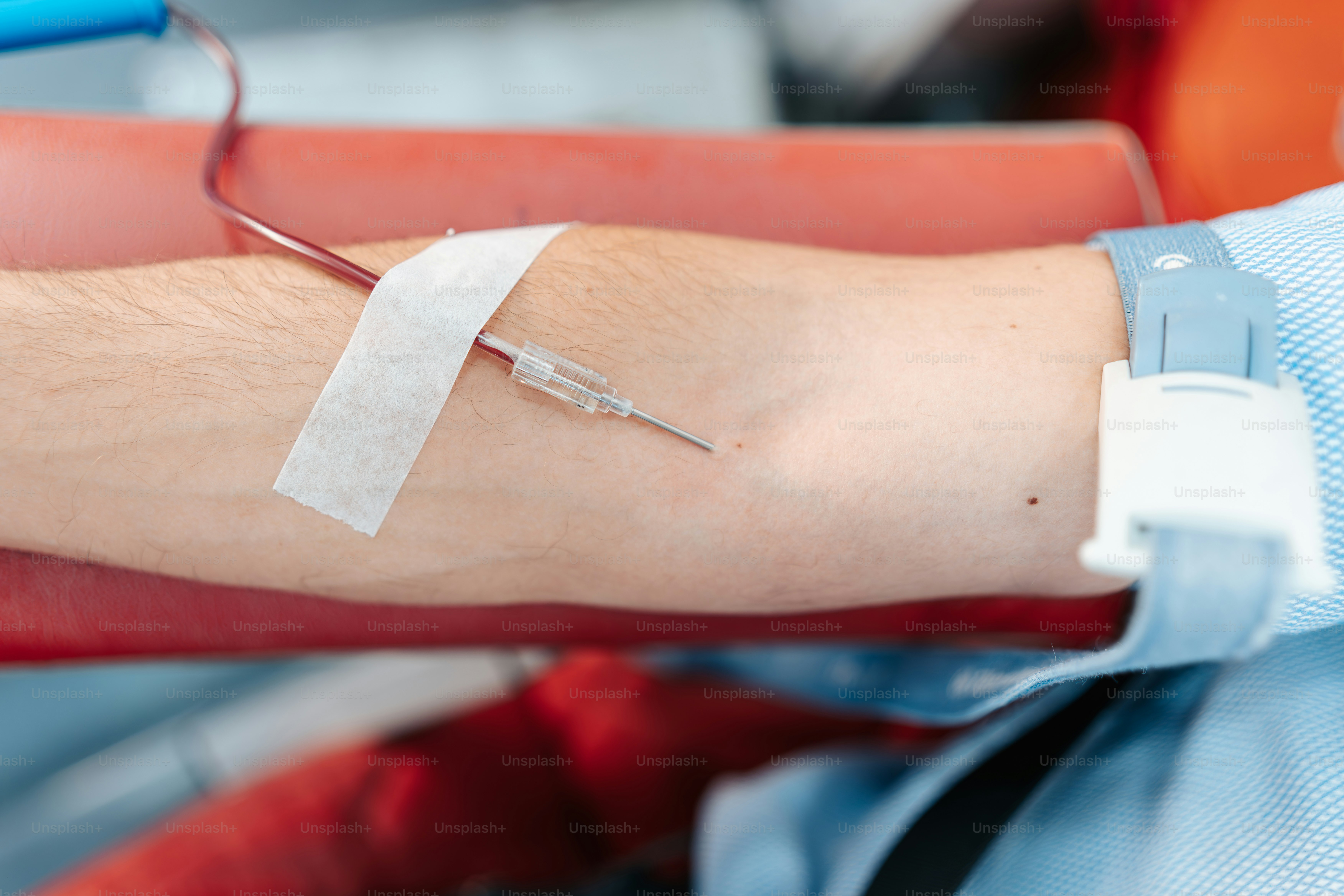A person with a bandage on their arm photo – Blood test Image on Unsplash