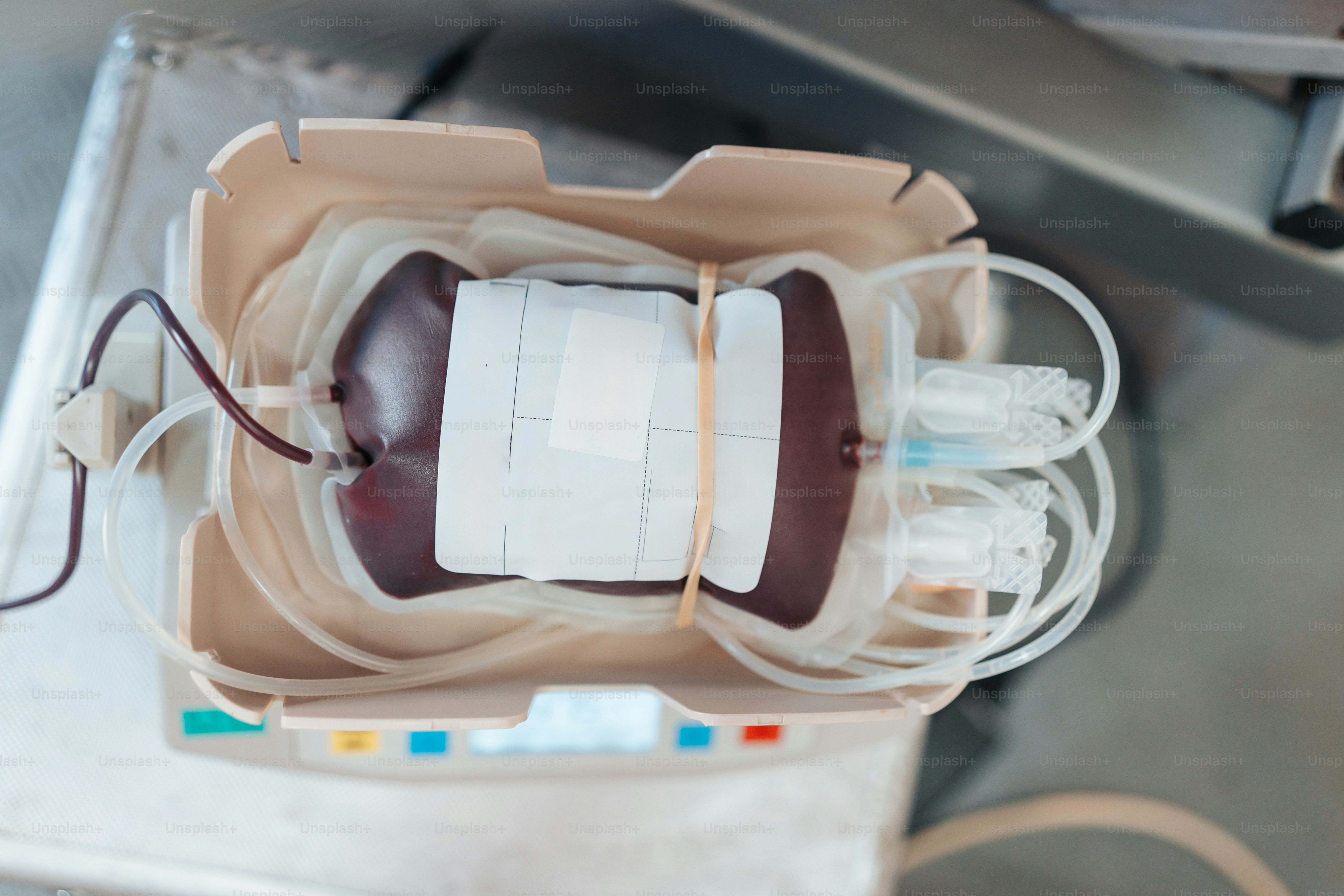 A close up of an electronic device with wires photo – Blood Image on ...