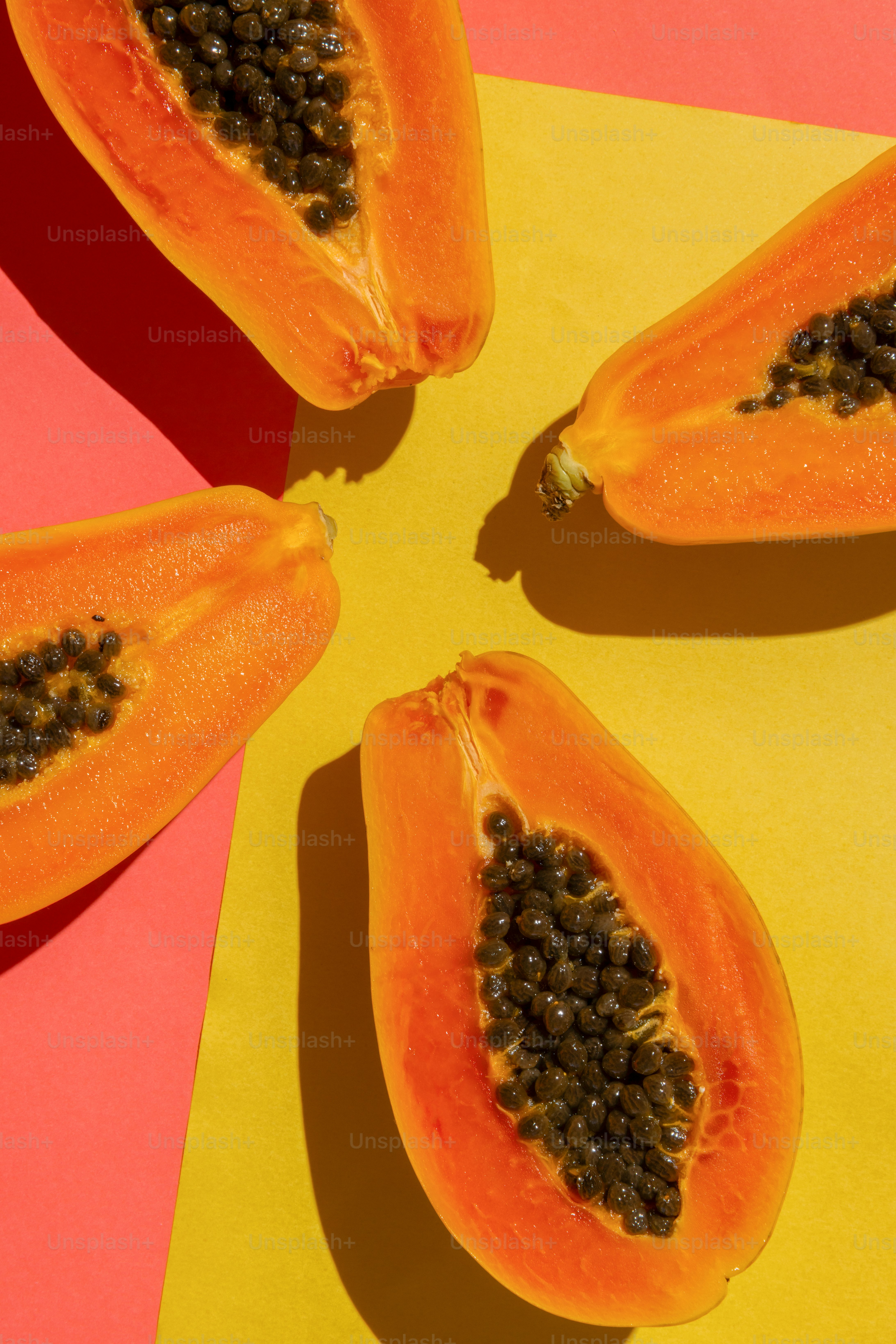 A dragon fruit with a shadow on a wall photo – Fruit Image on Unsplash