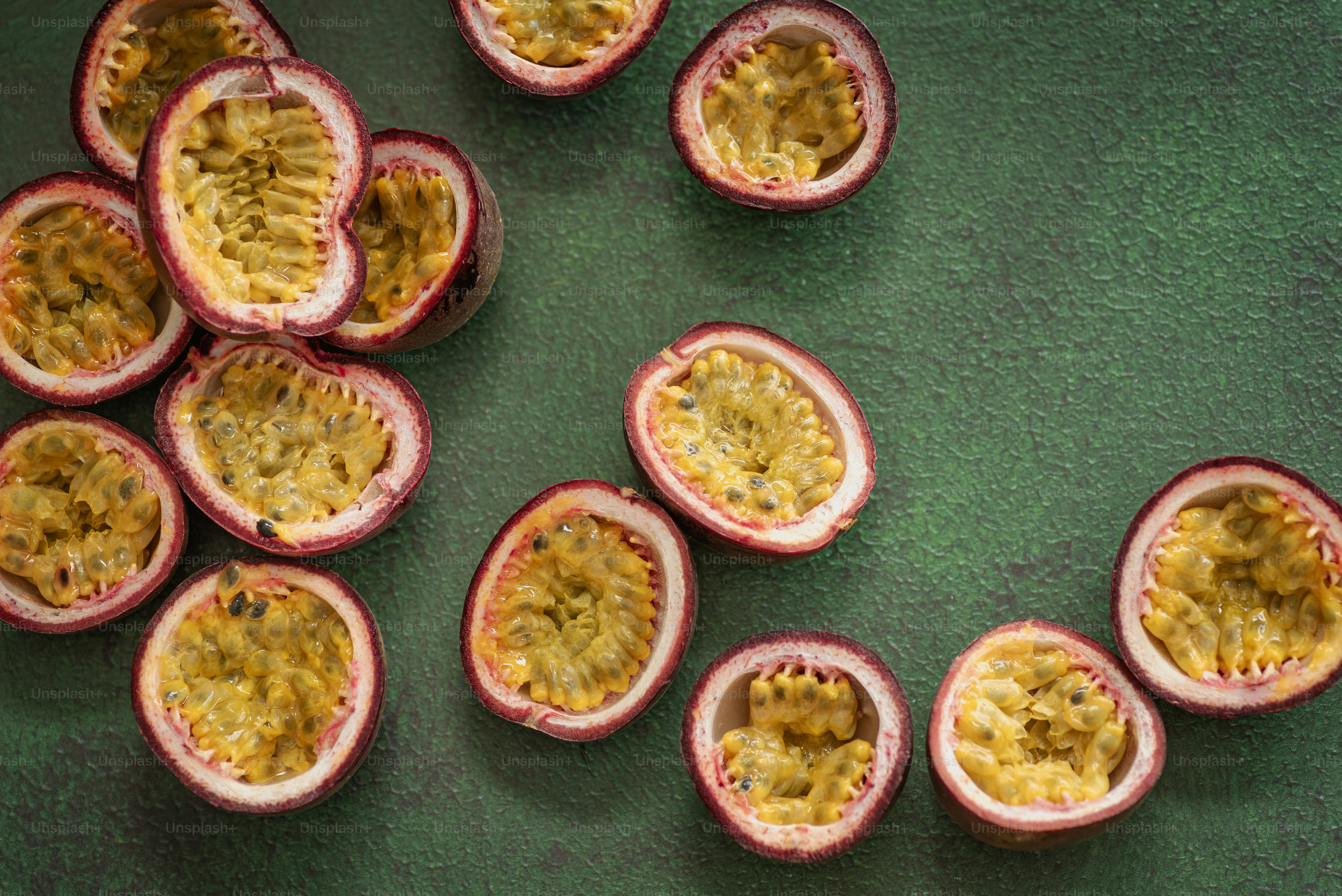 A bunch of pieces of fruit sitting on top of a table photo – Fruit ...