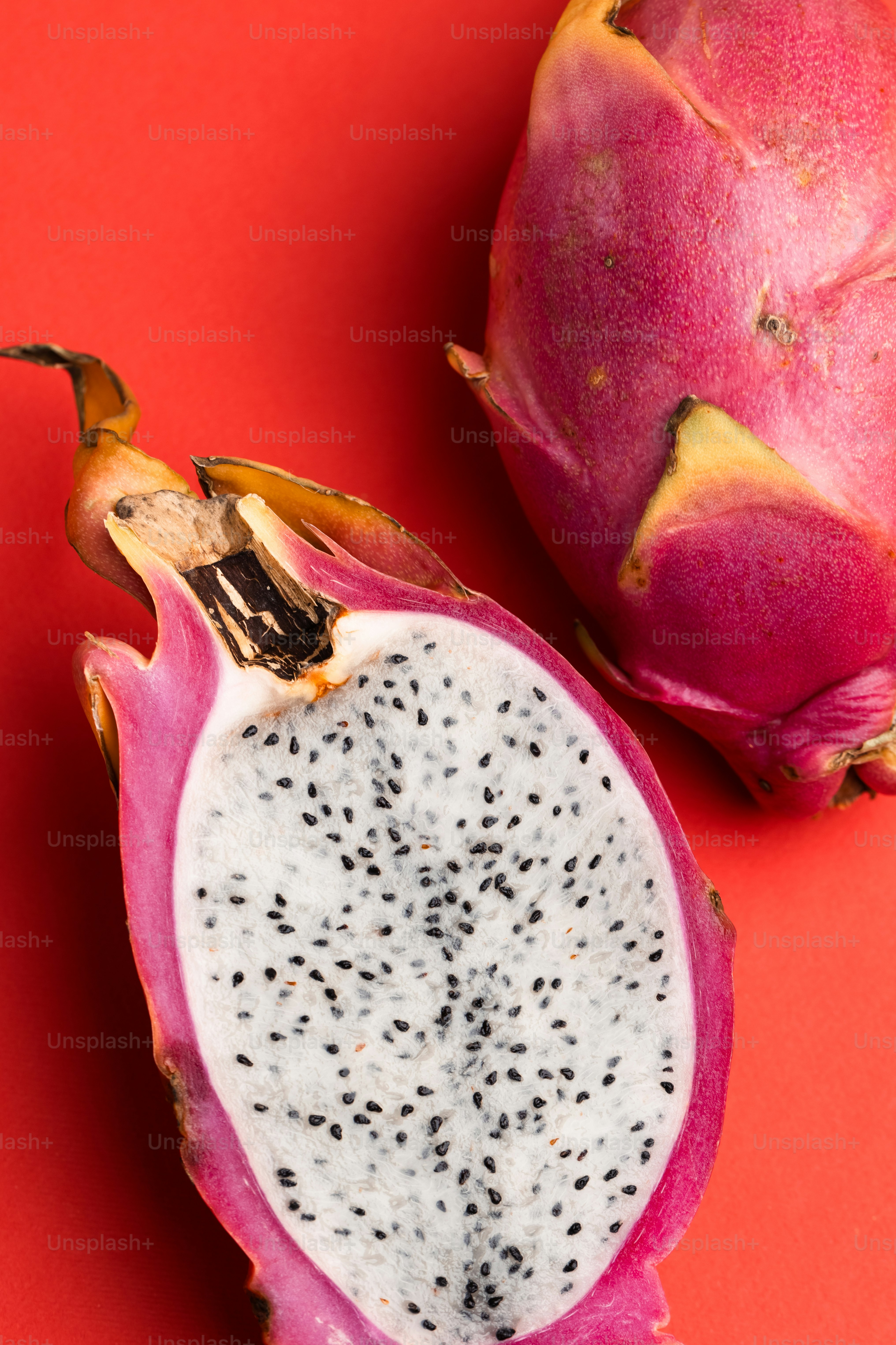 A bunch of cut up fruit sitting on top of a yellow surface photo – Food ...
