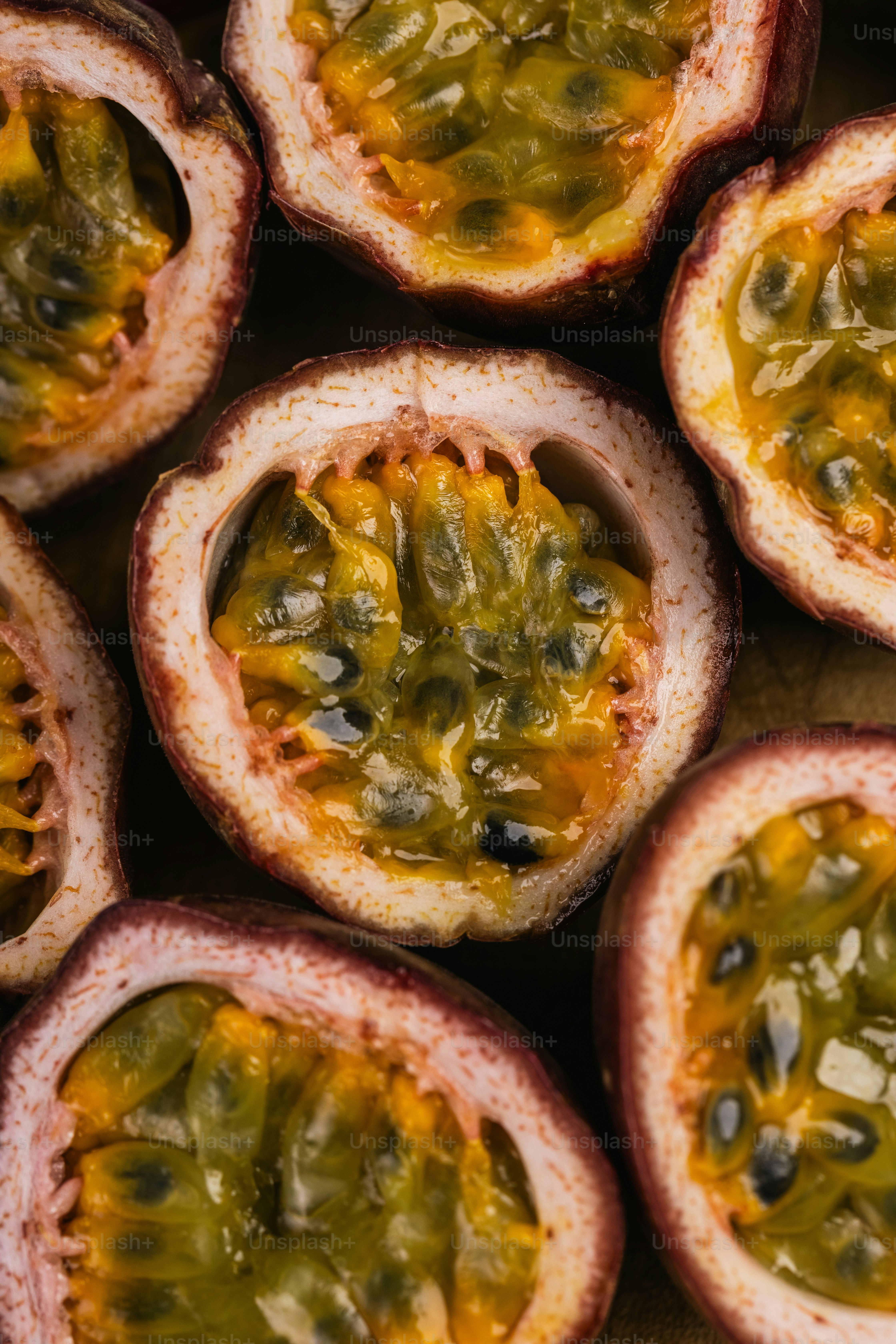A bunch of cut up fruit sitting on top of a yellow surface photo – Food ...