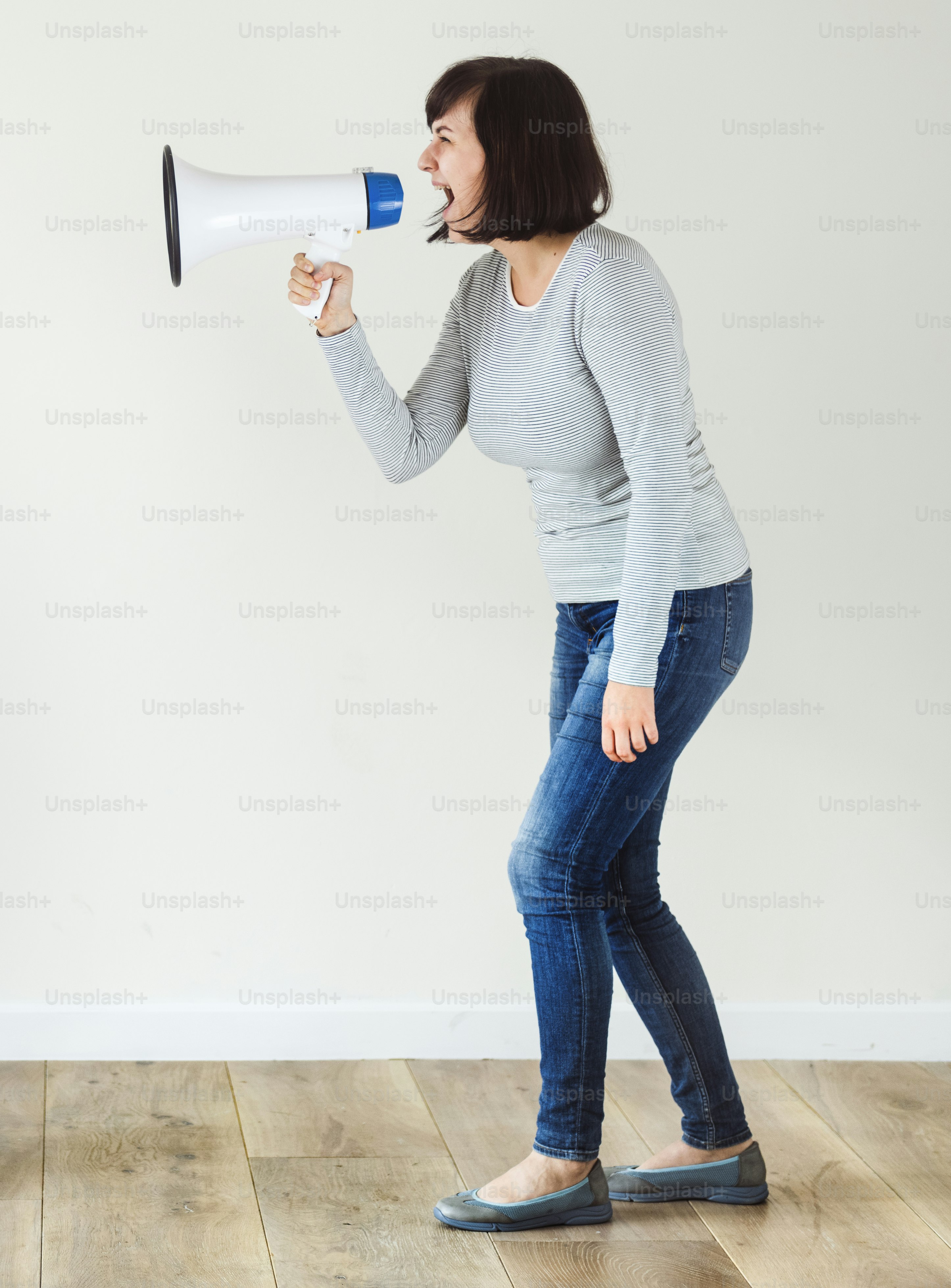 Woman using megaphone for annoucement photo – Mouth Image on Unsplash