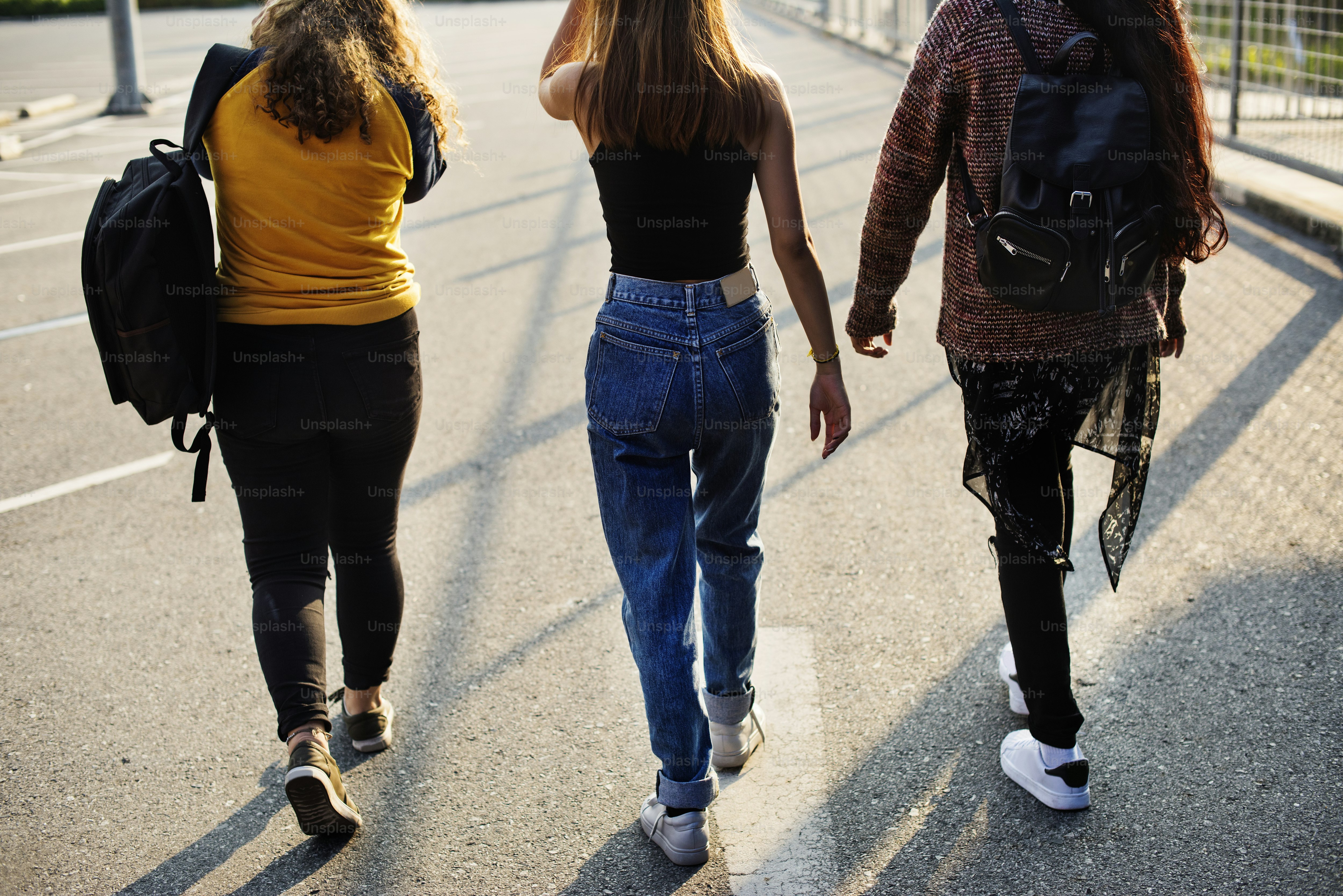Teenage girl friends walking together photo – Walking Image on Unsplash