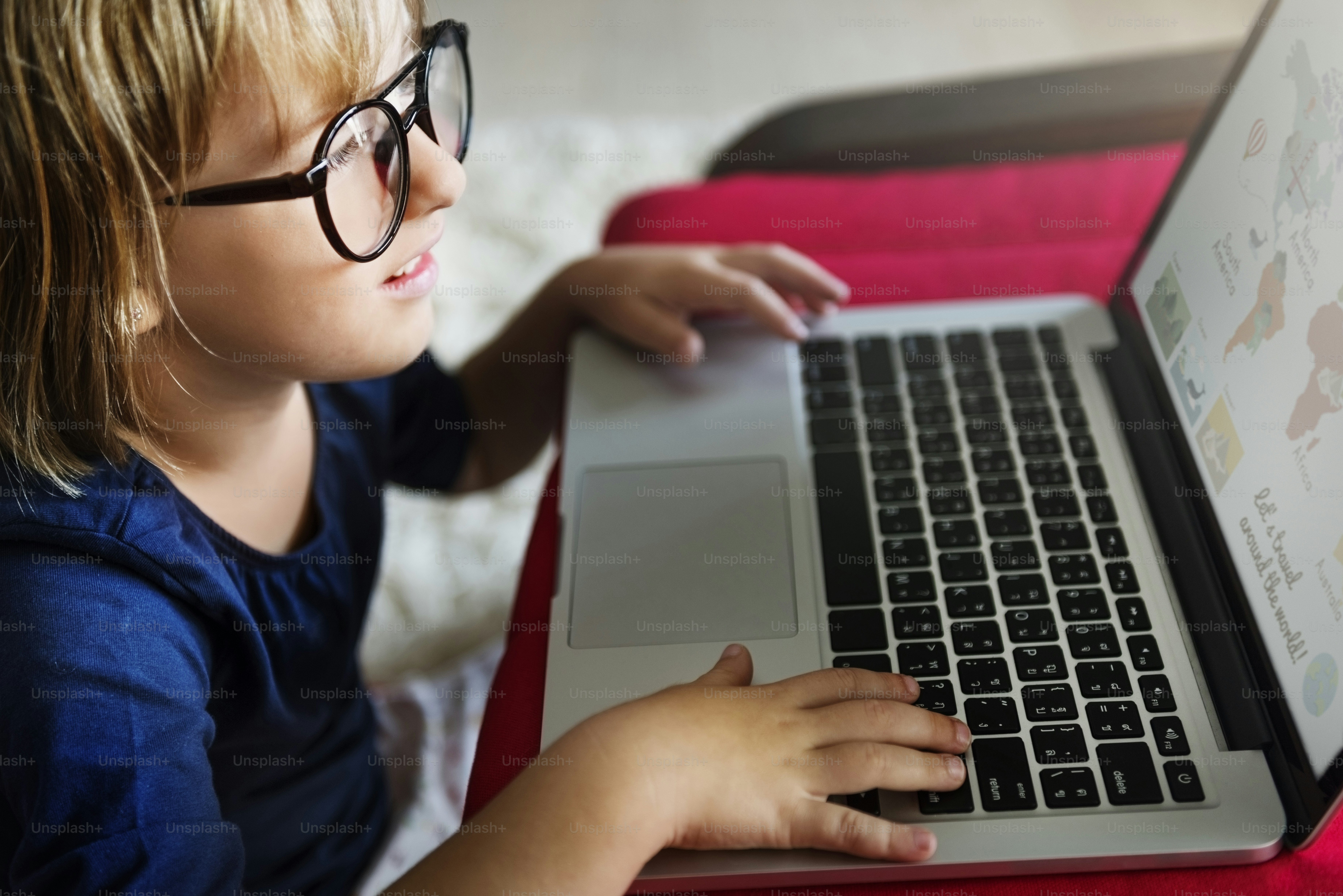 Kid Surfing Computer Internet Lifestyle Concept photo – Using laptop ...