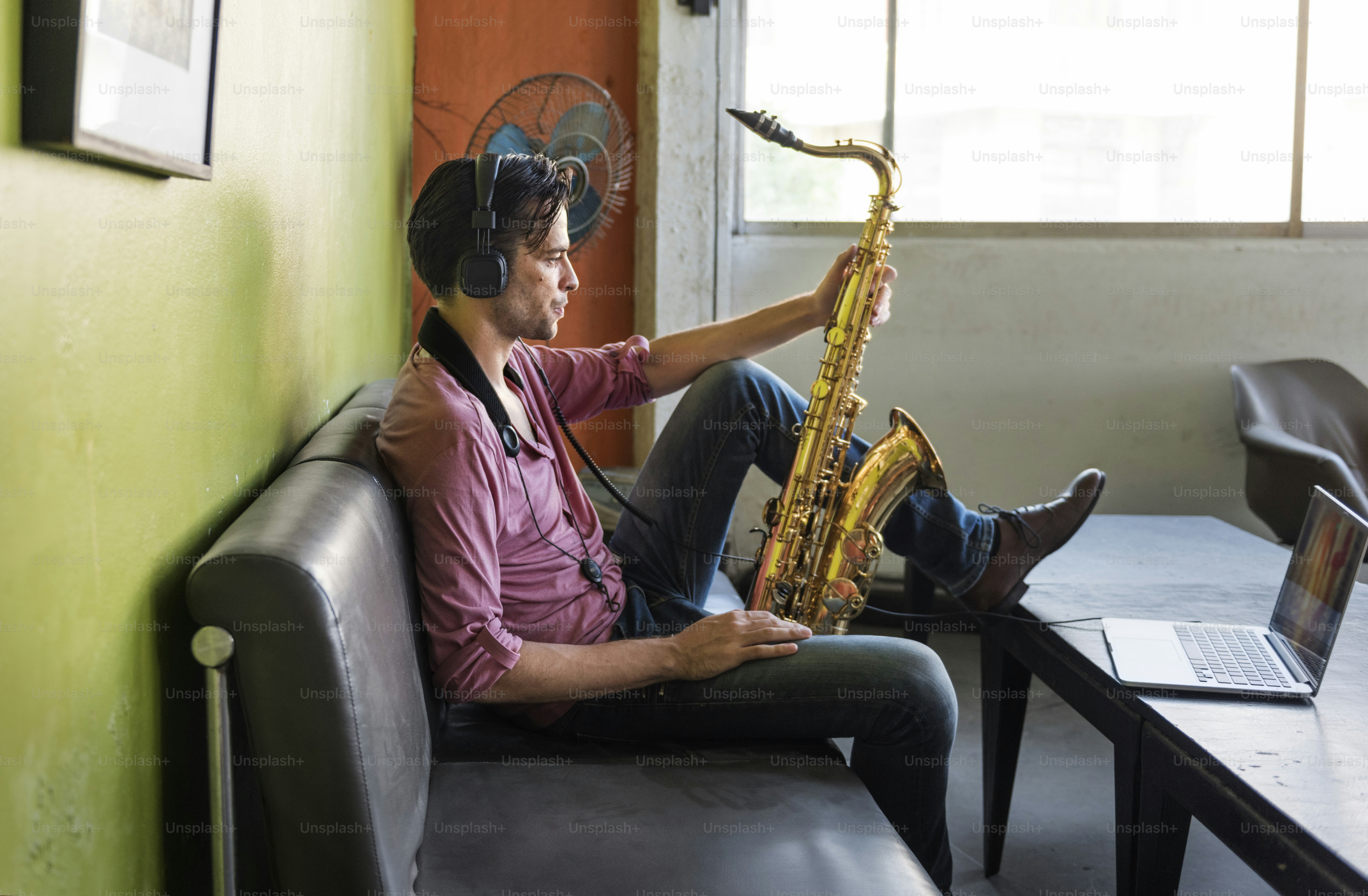 Saxophone Symphony Musician Jazz Instrument Concept photo – Man Image ...