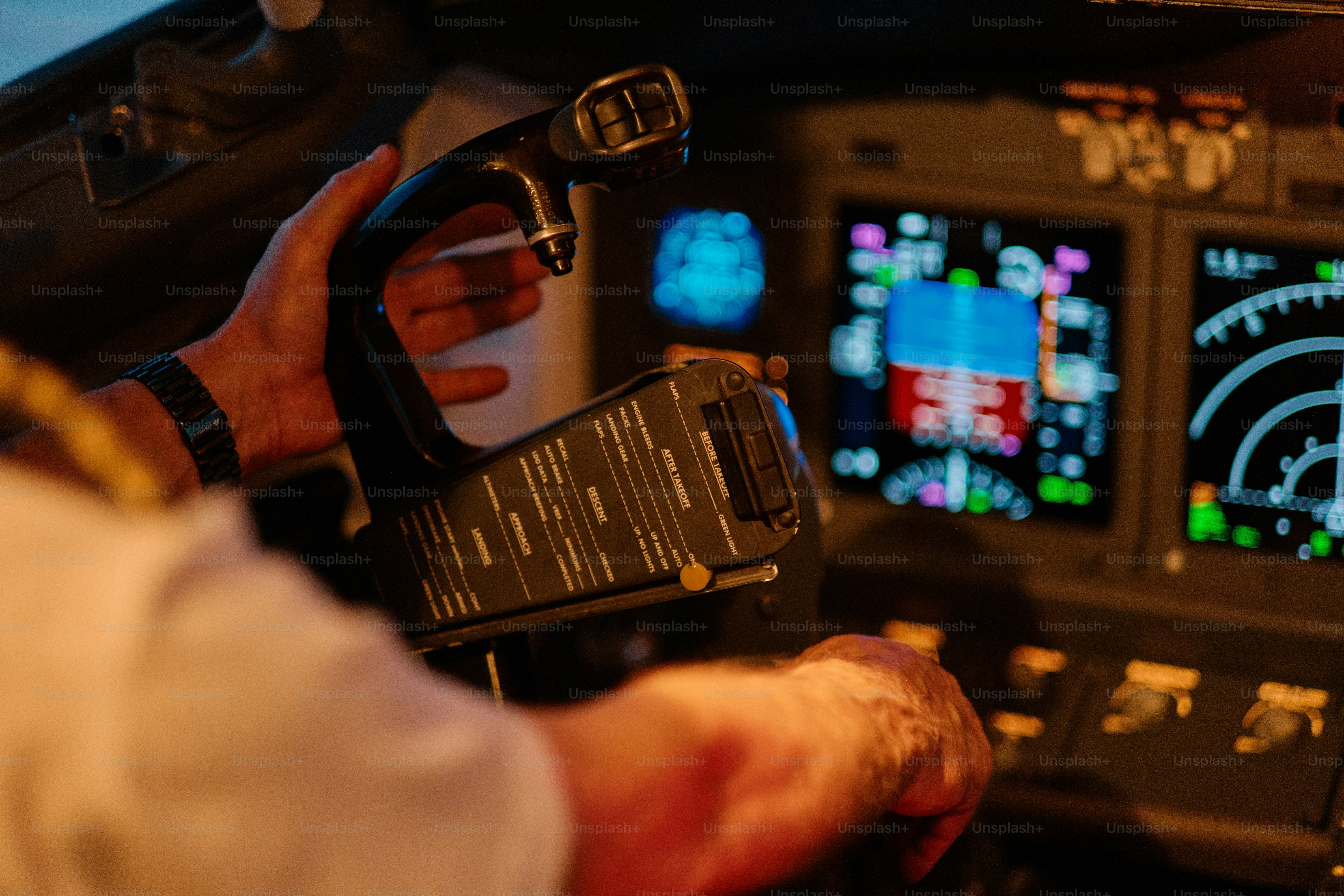 A man sitting in the cockpit of a plane photo – Travel Image on Unsplash