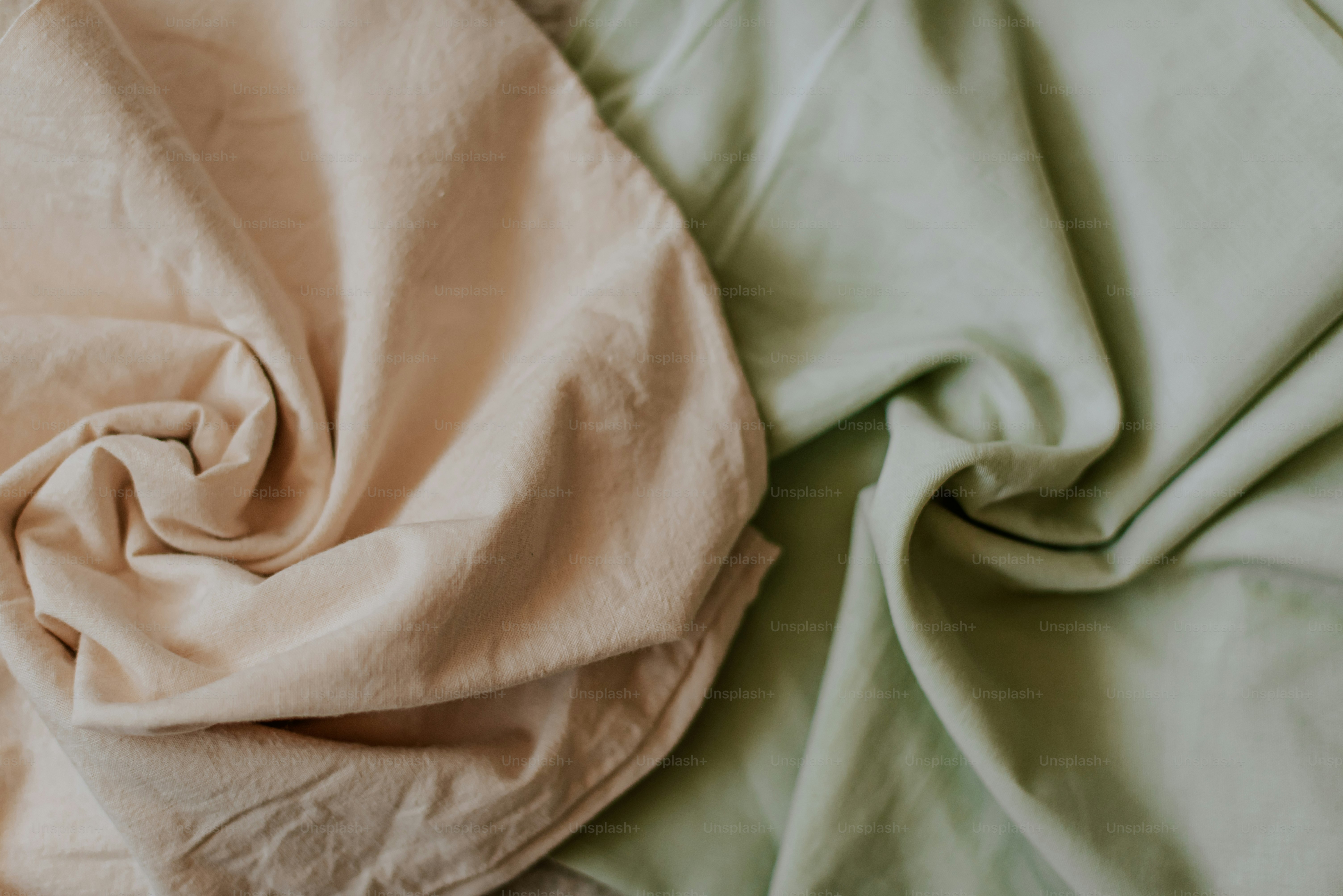 A close up of a sheet on a bed photo – Fabric Image on Unsplash