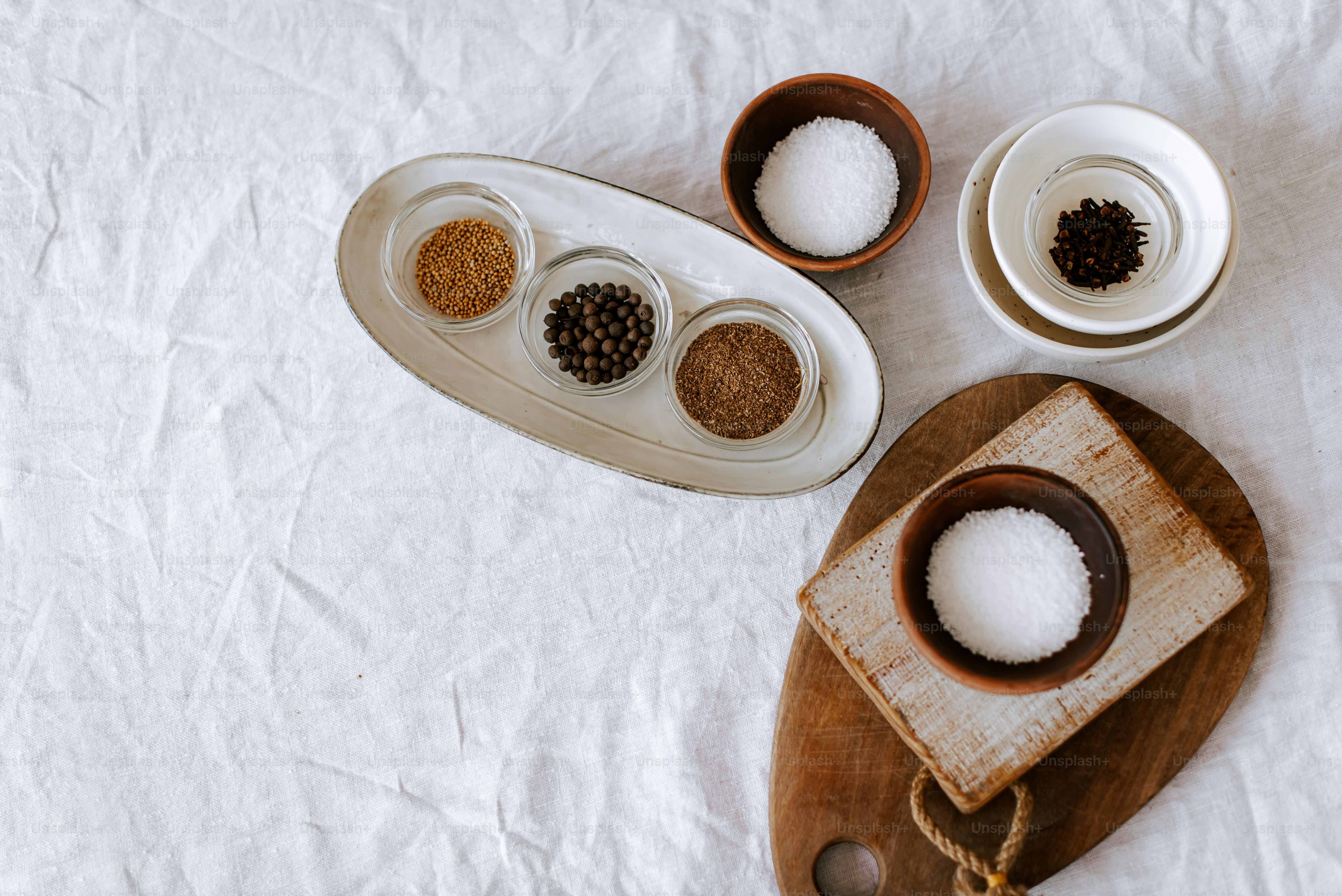 A table topped with bowls filled with different types of food photo ...