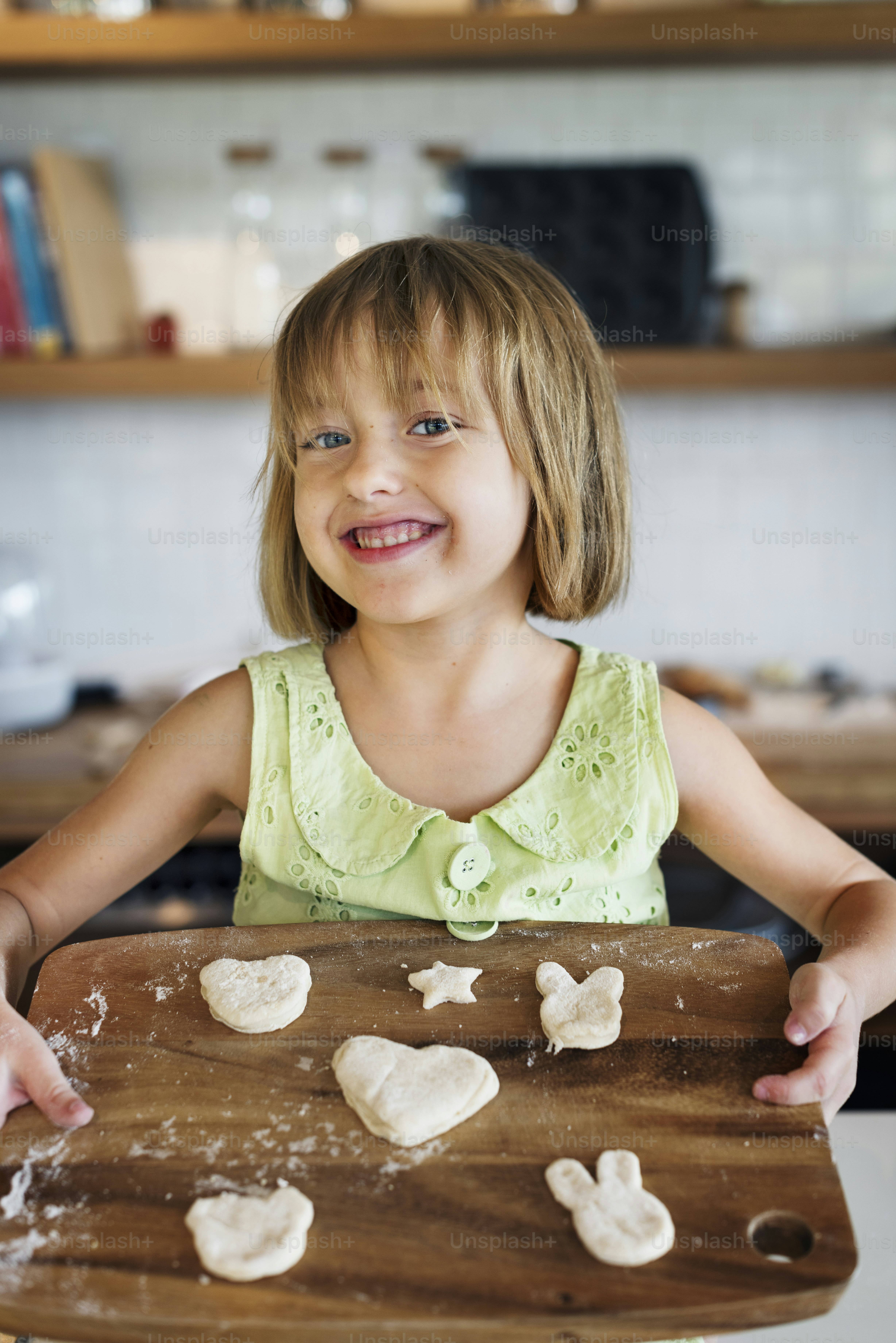 Little Girl Smiling Bake Cookie Concept photo – Preparation Image on ...