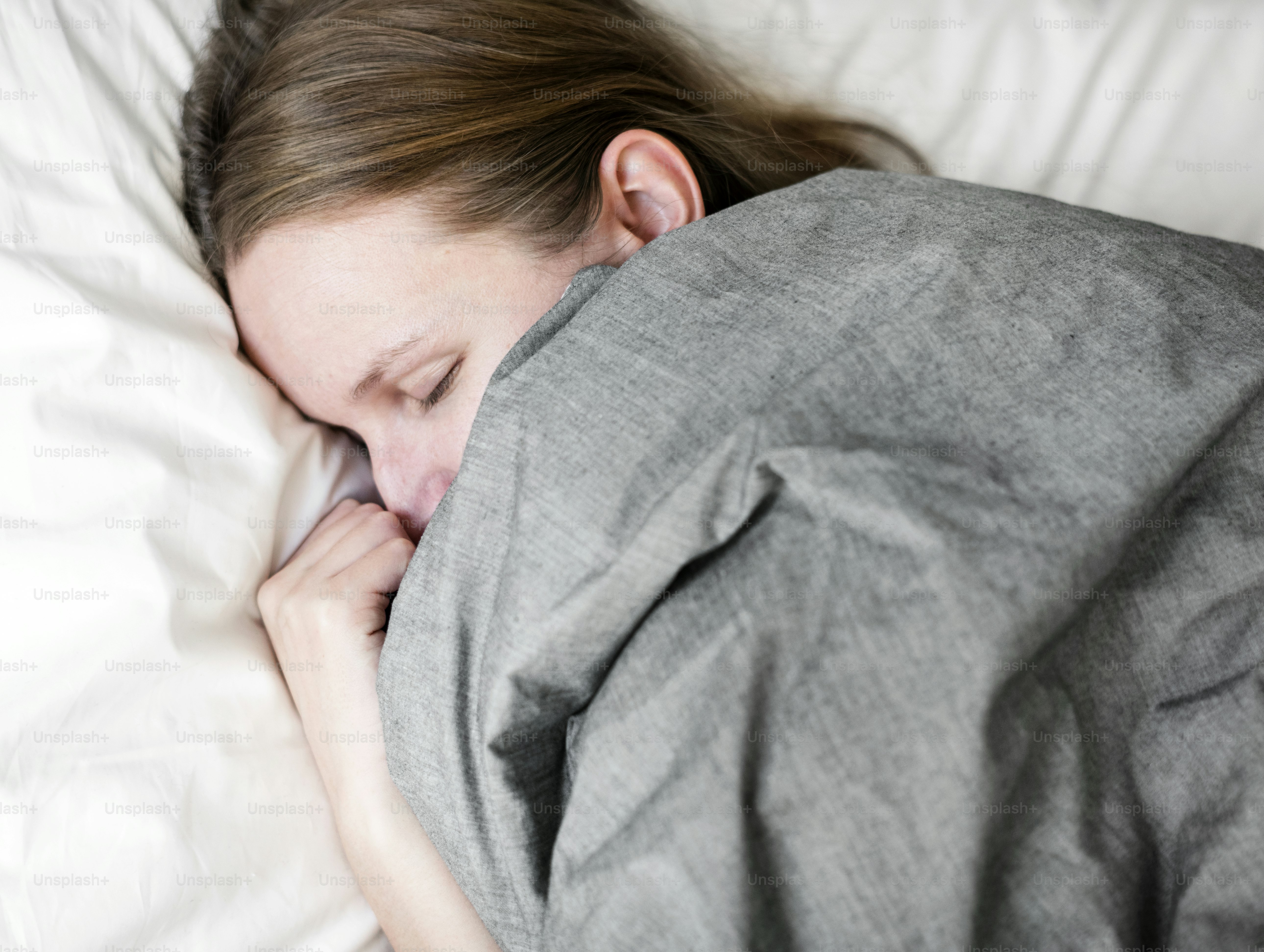 Caucasian woman sleeping in bed photo – Sleeping Image on Unsplash