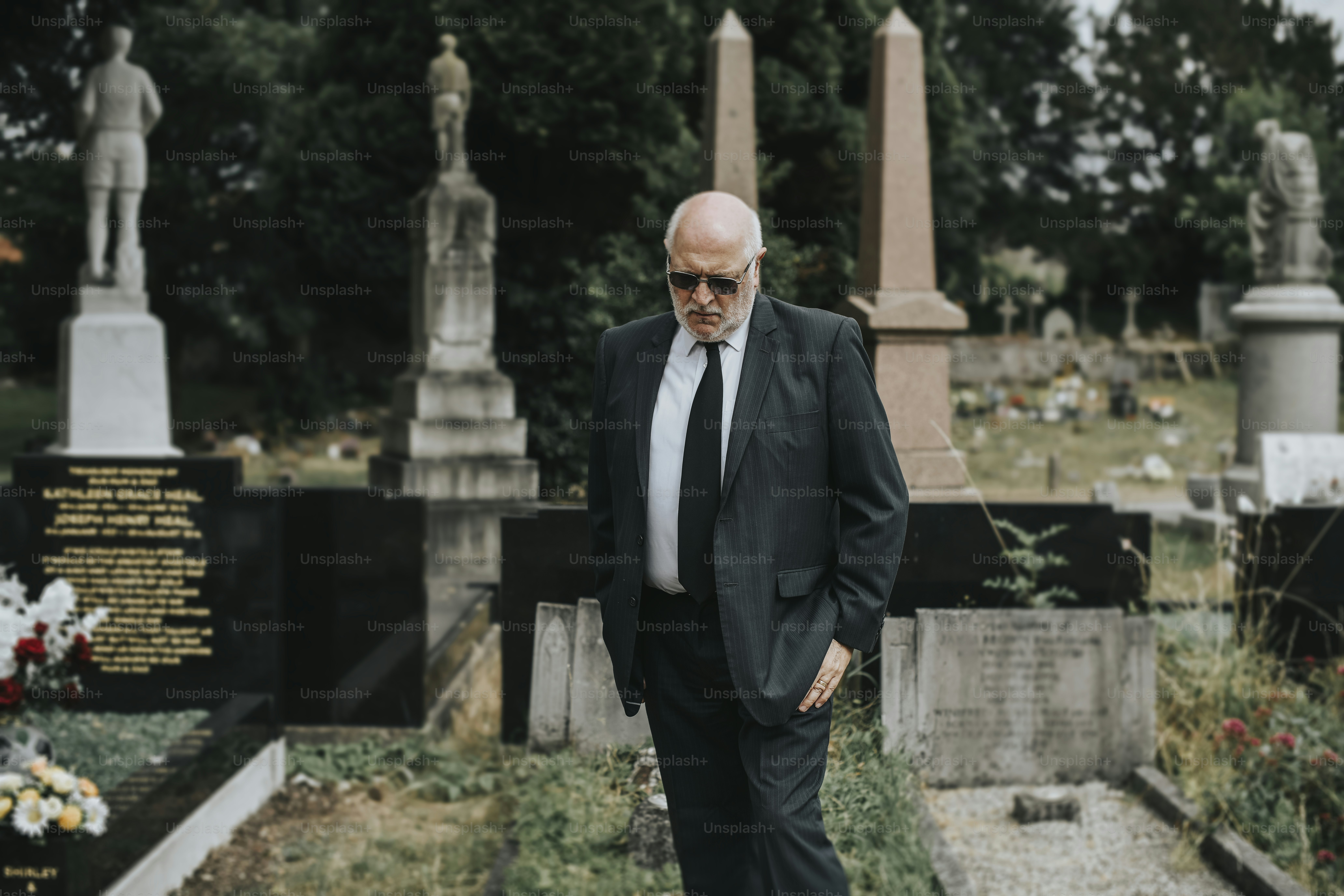 Old man mourning at the graveyard photo – Photography Image on Unsplash