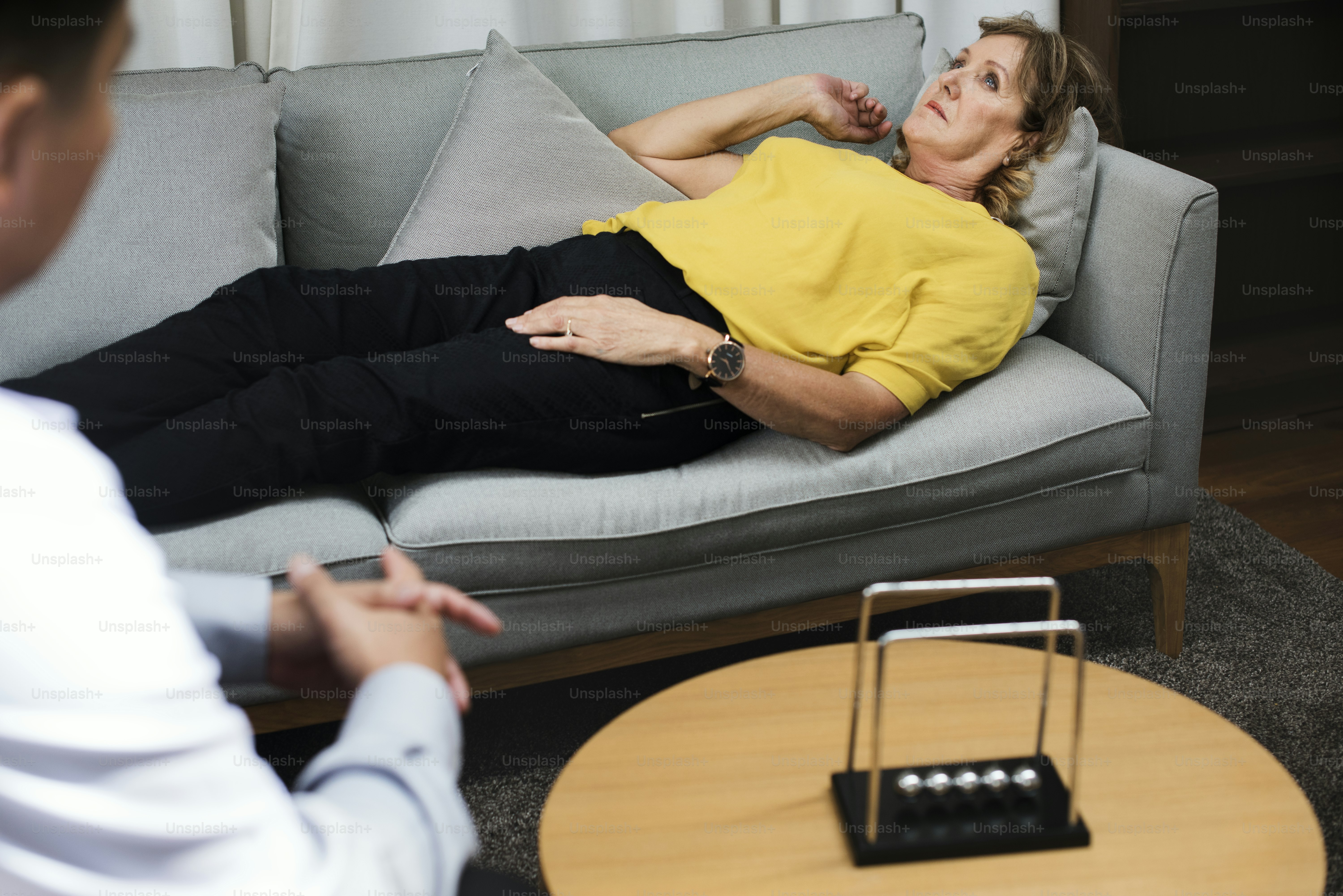 Depressed patient getting treatment from a psychologist photo ...