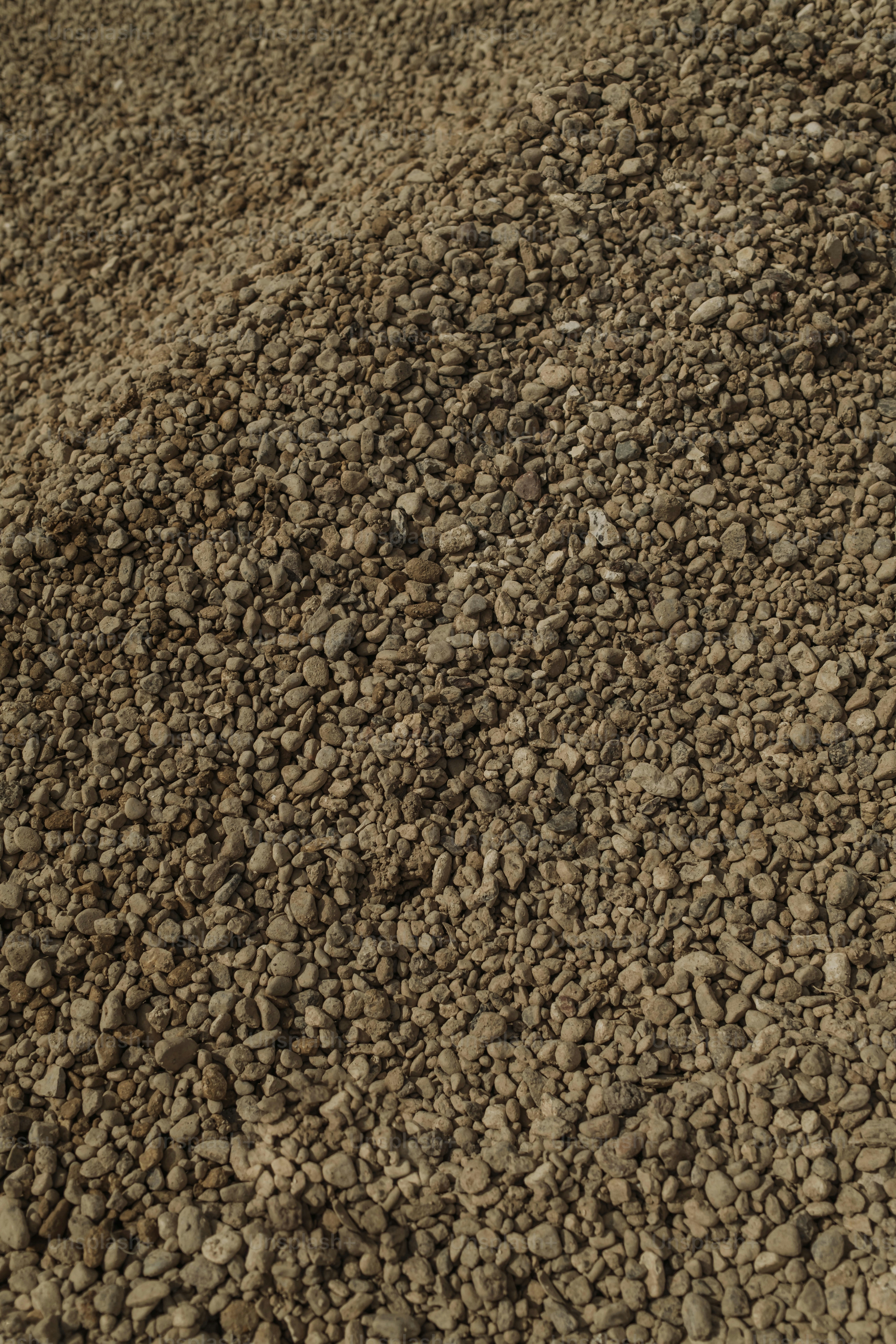 A large pile of dirt sitting on top of a field photo – Neutral ...