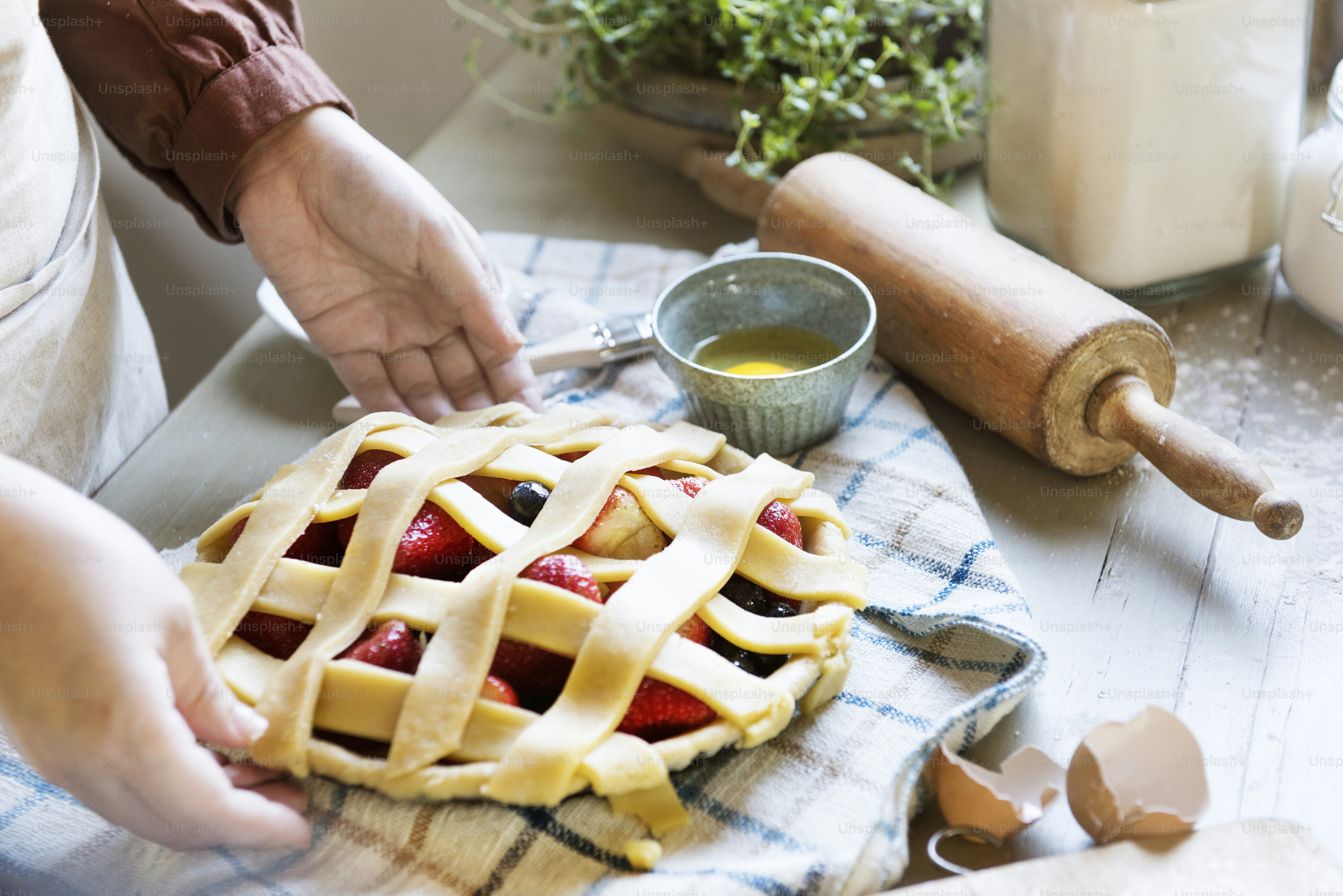 A person baking fruit pie food photography recipe idea photo – Hand ...