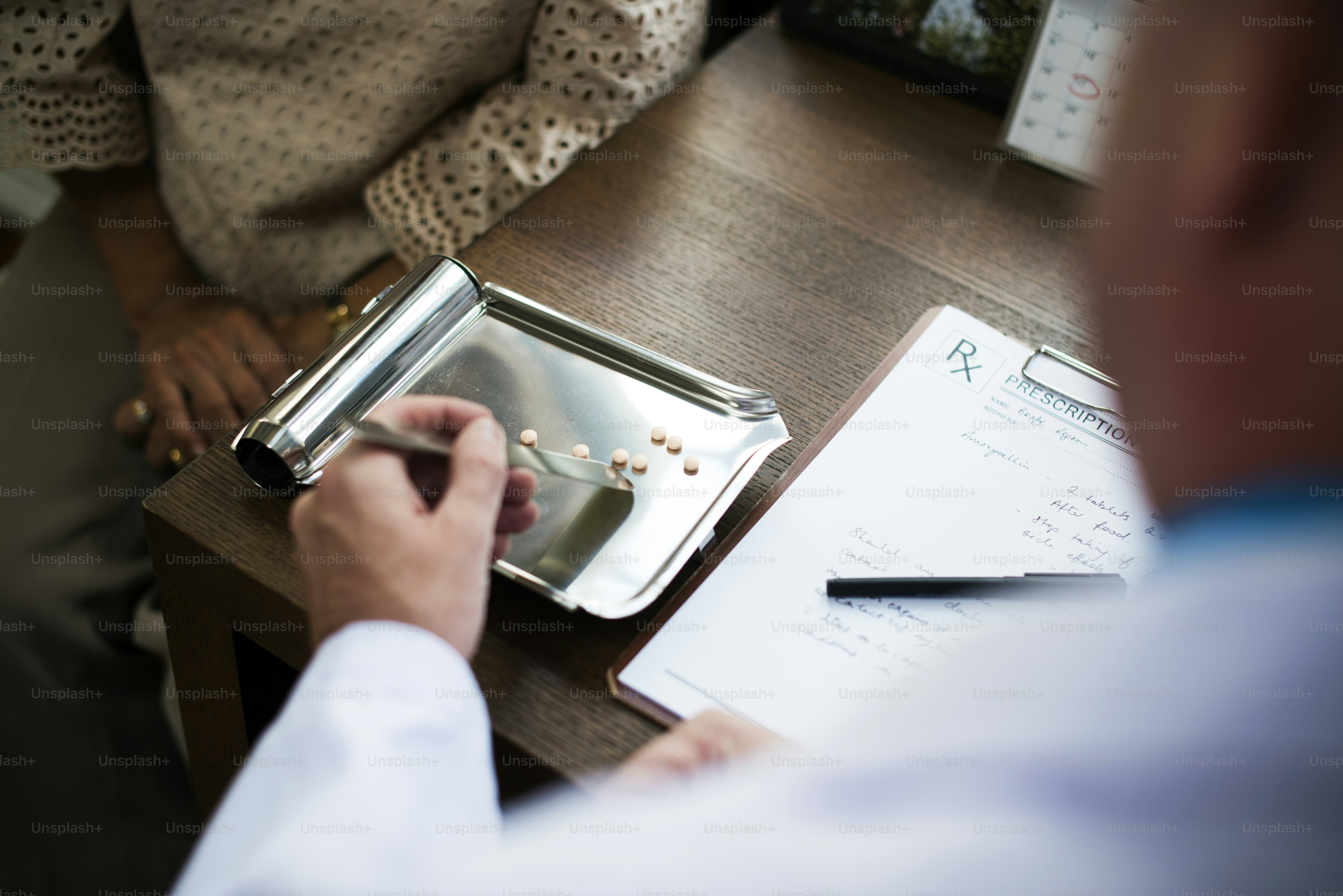Doctor with patient prescription photo – Pharmaceutical industry Image ...