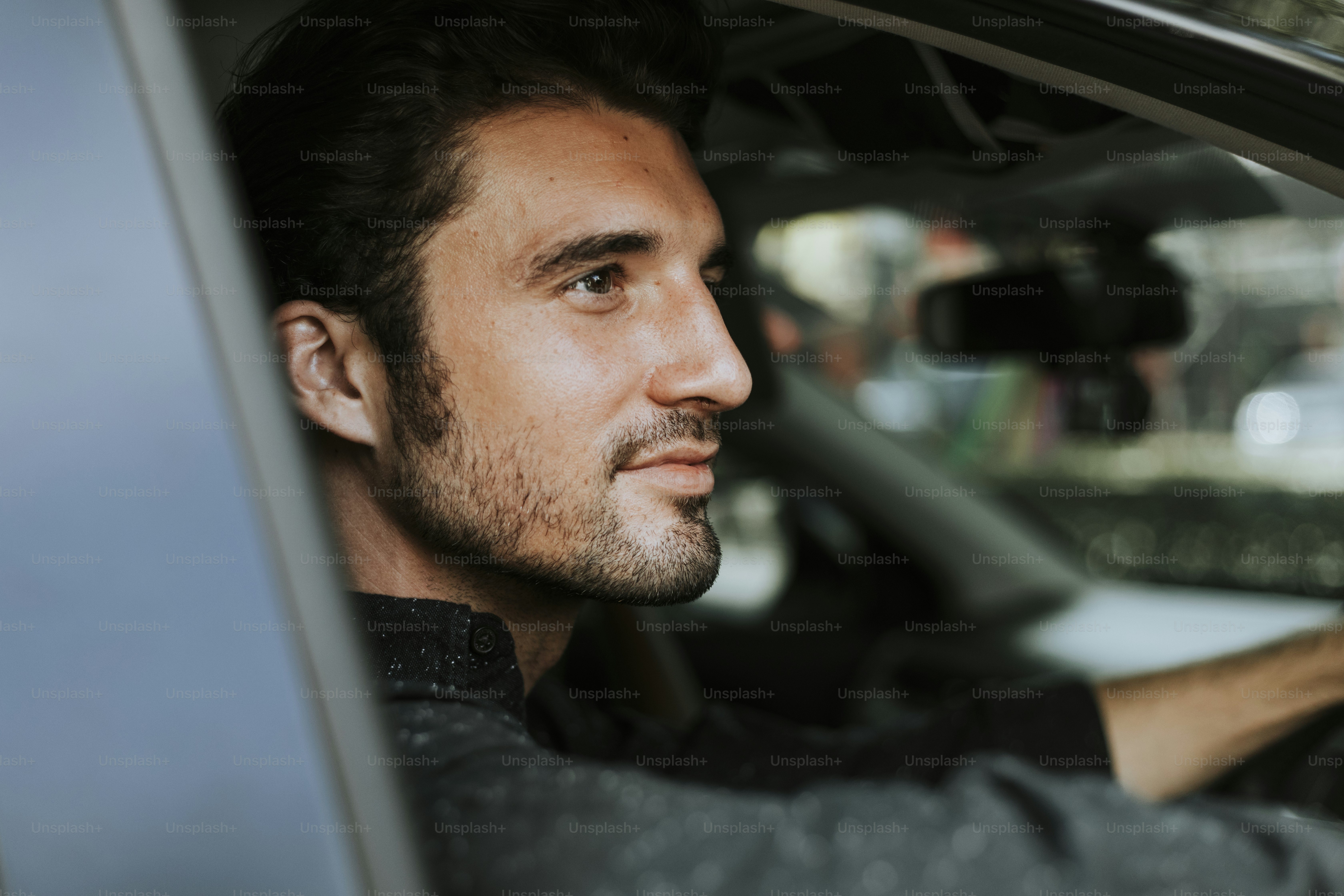 Handsome male driver sitting in a car photo – Travel Image on Unsplash