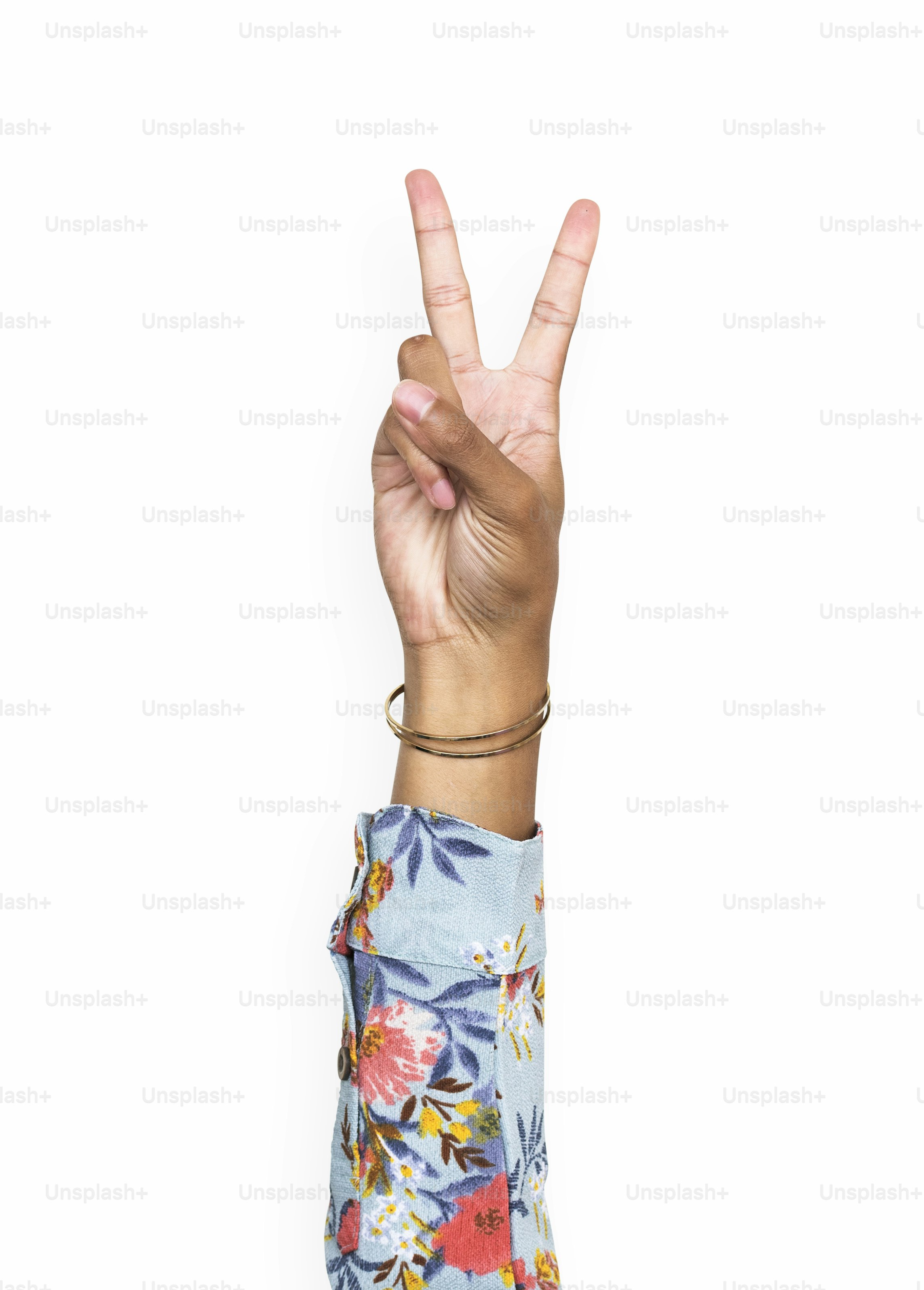 Hand gesturing peace with fingers photo – Photography Image on Unsplash