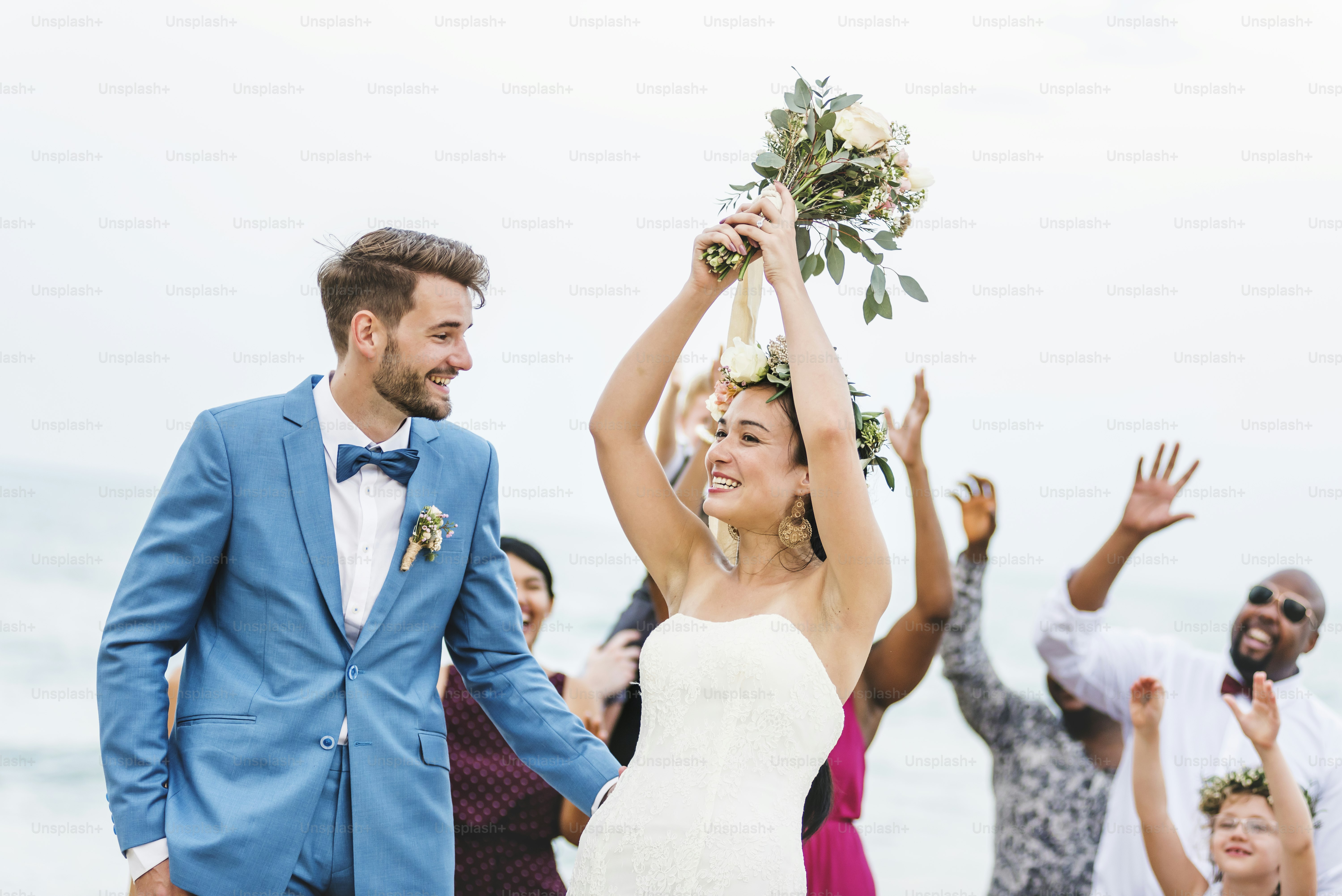 Bride throwing flower bouquet to guests photo – Horizontal Image on ...