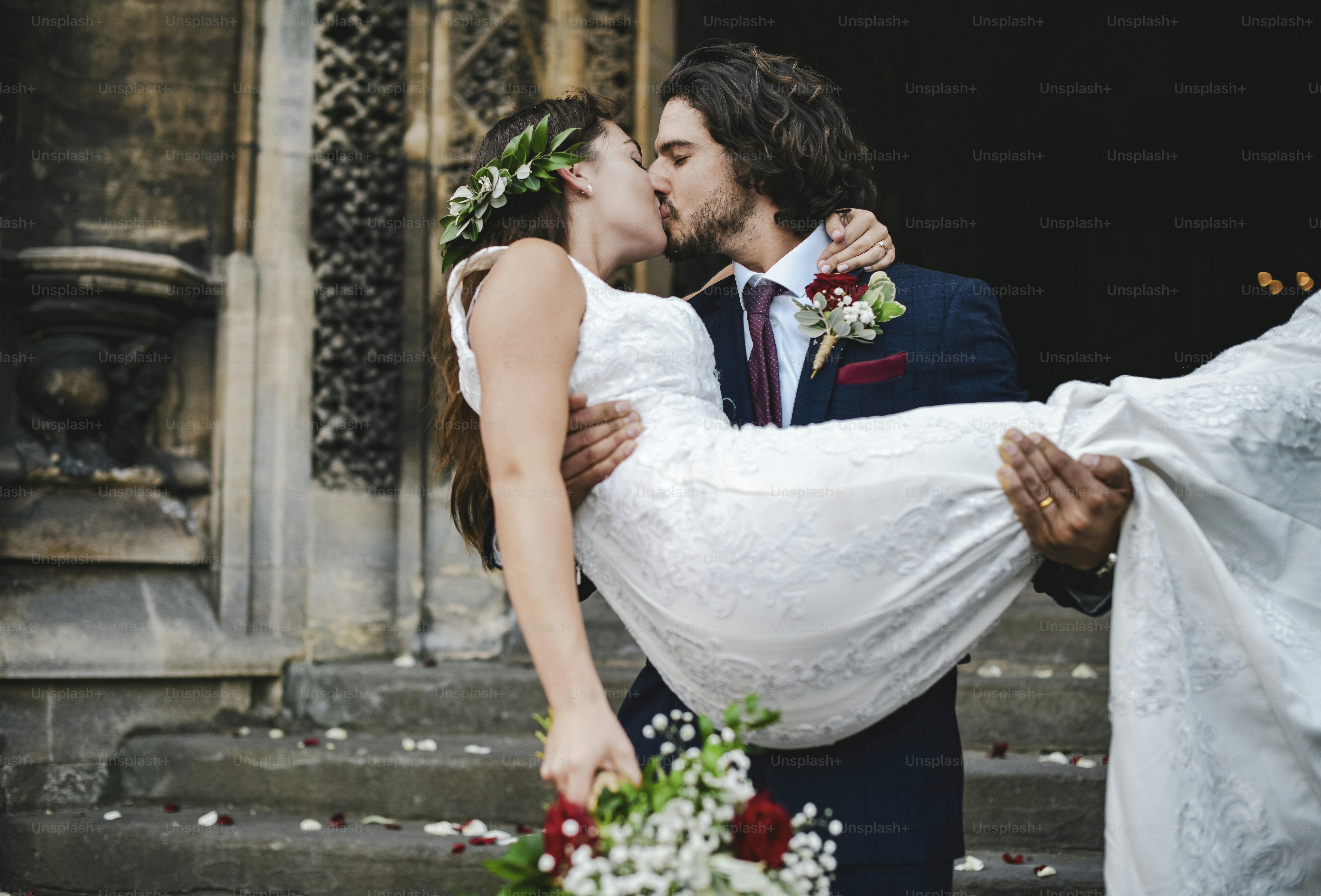 Groom lifting up his beautiful bride photo – Wedding Image on Unsplash