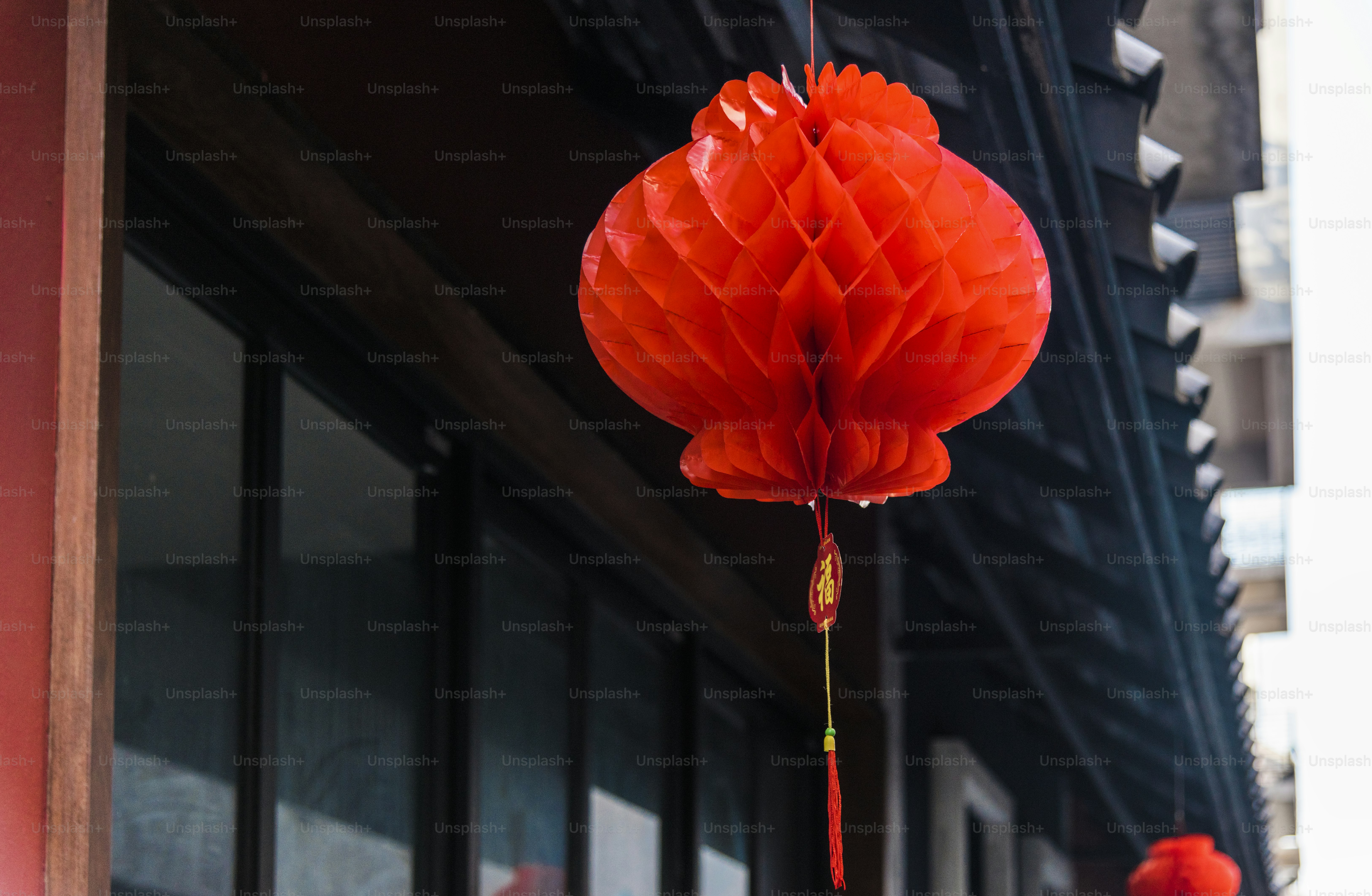 Closeup of red honeycomb paper lantern photo – Tradition Image on Unsplash