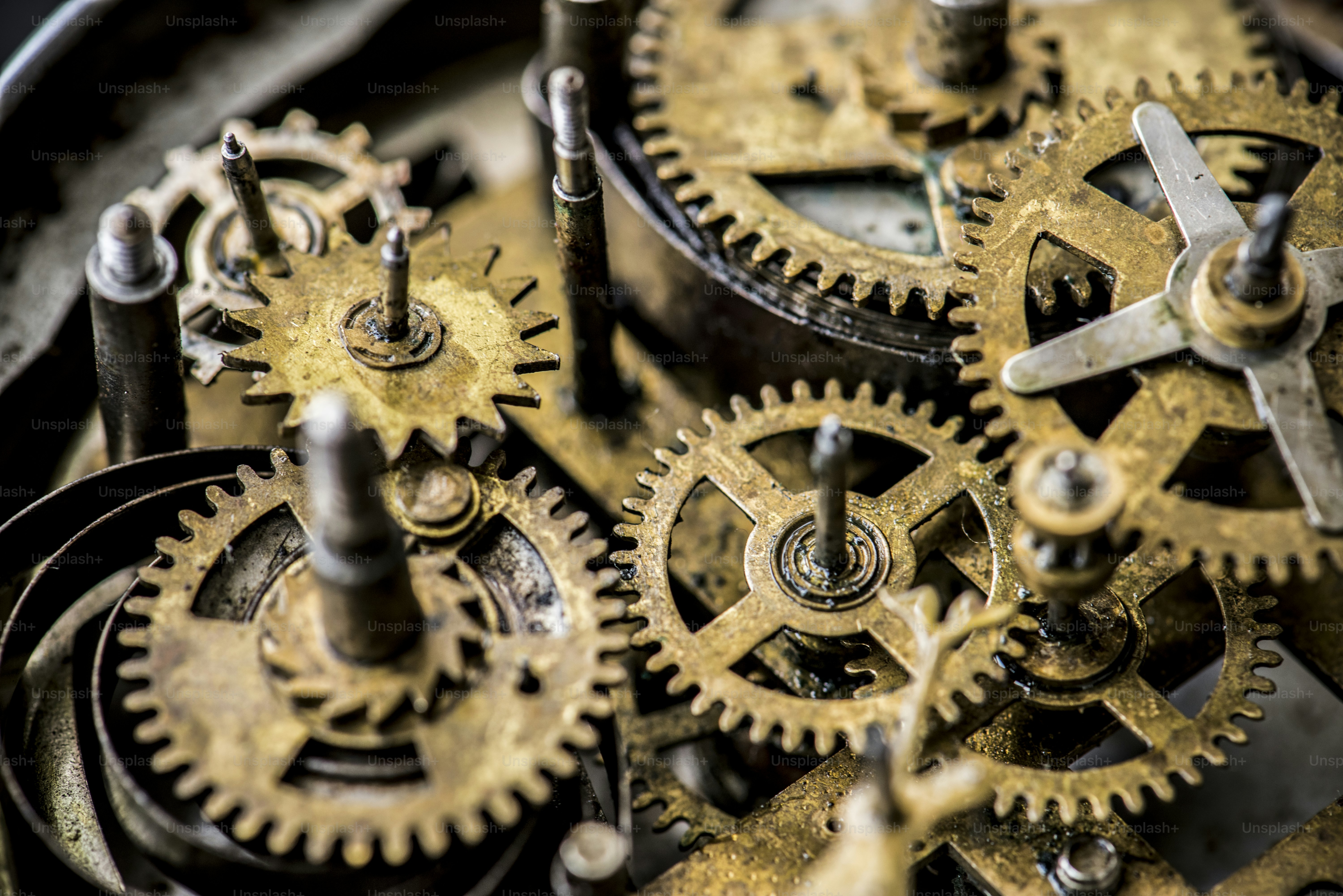 Closeup of gears and cogs clockwork photo – Photography Image on Unsplash