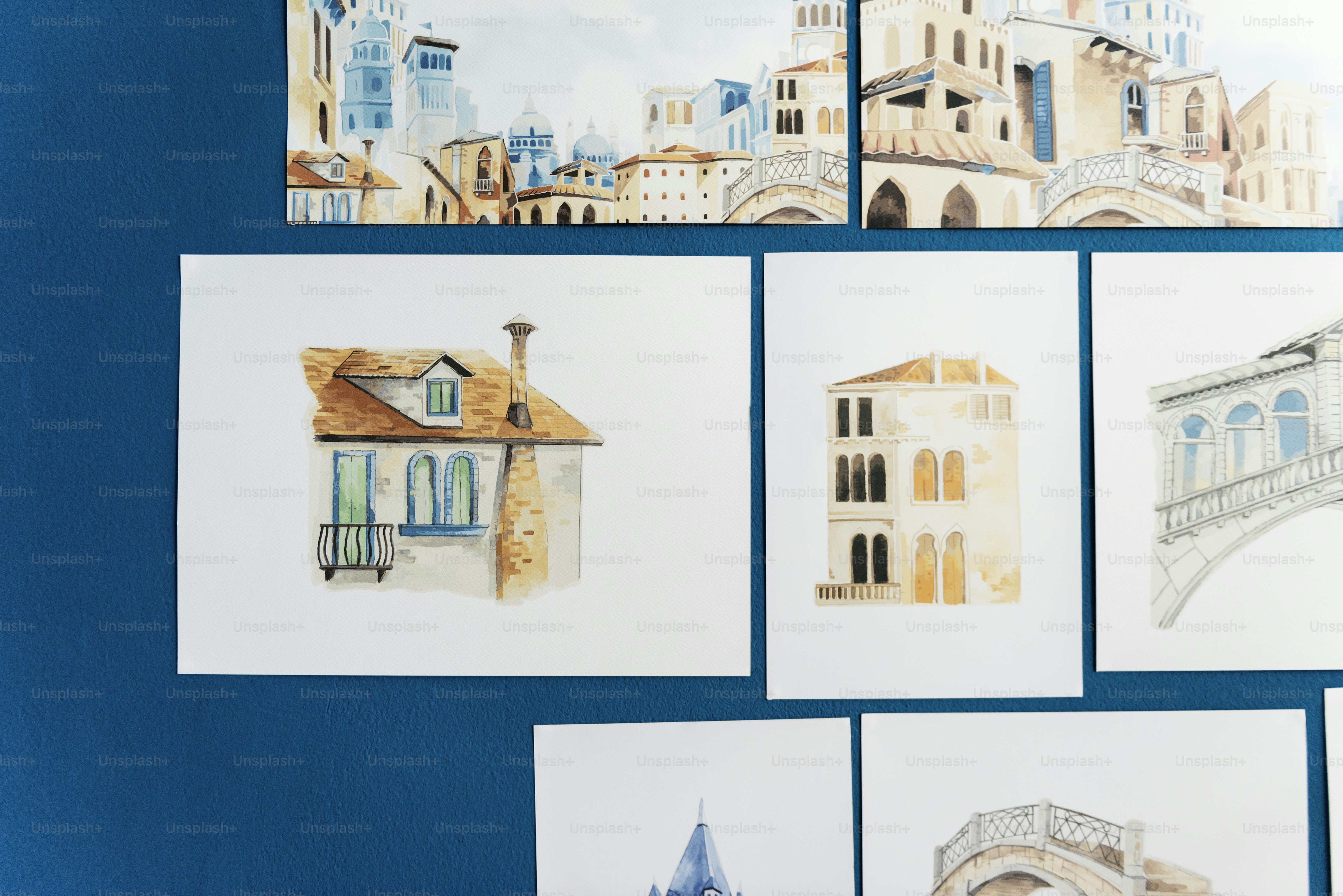 Hand drawn sketches on a blue wall ***These drawings are derived from ...