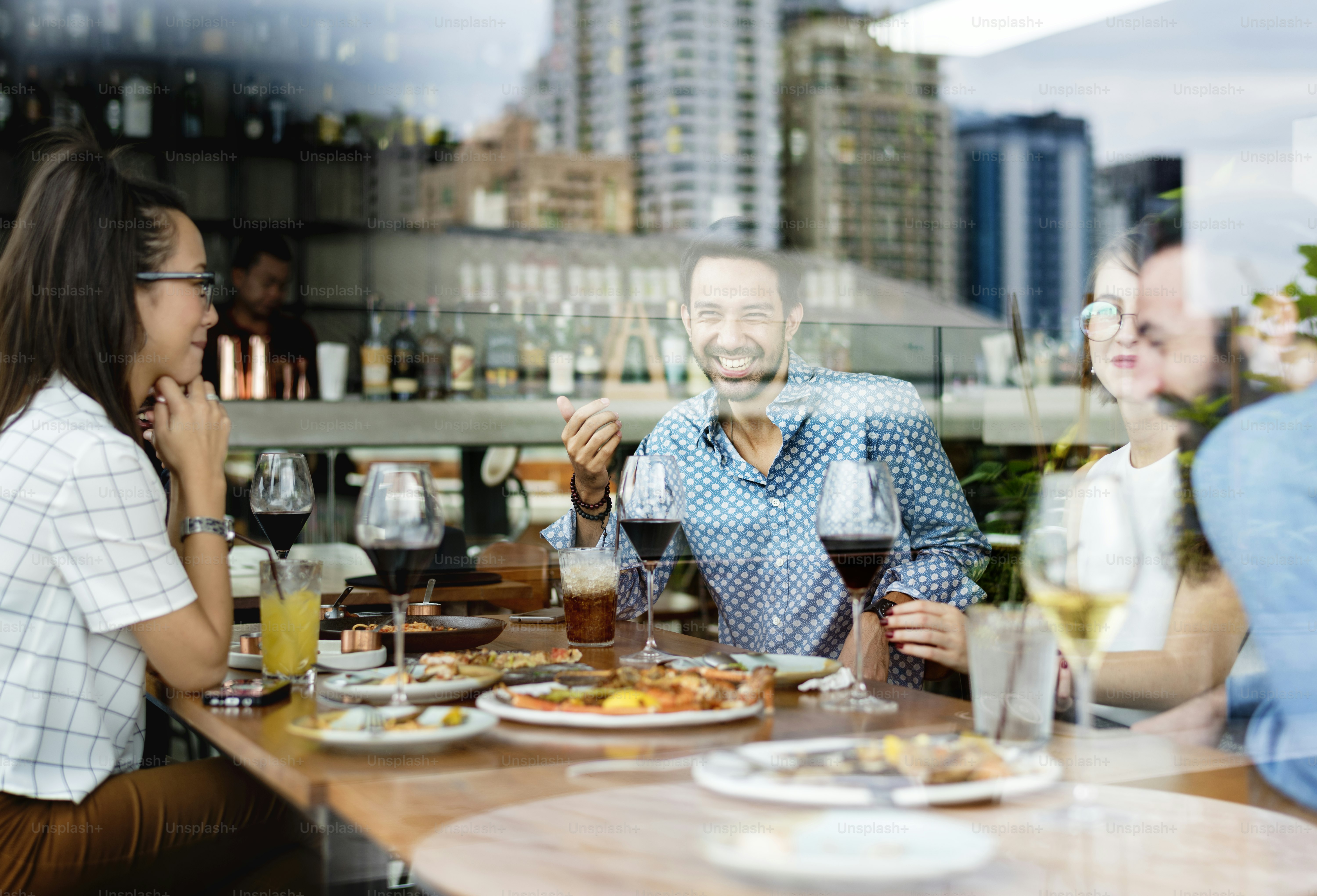 People having meal together in the restaurant photo – Relaxation Image ...