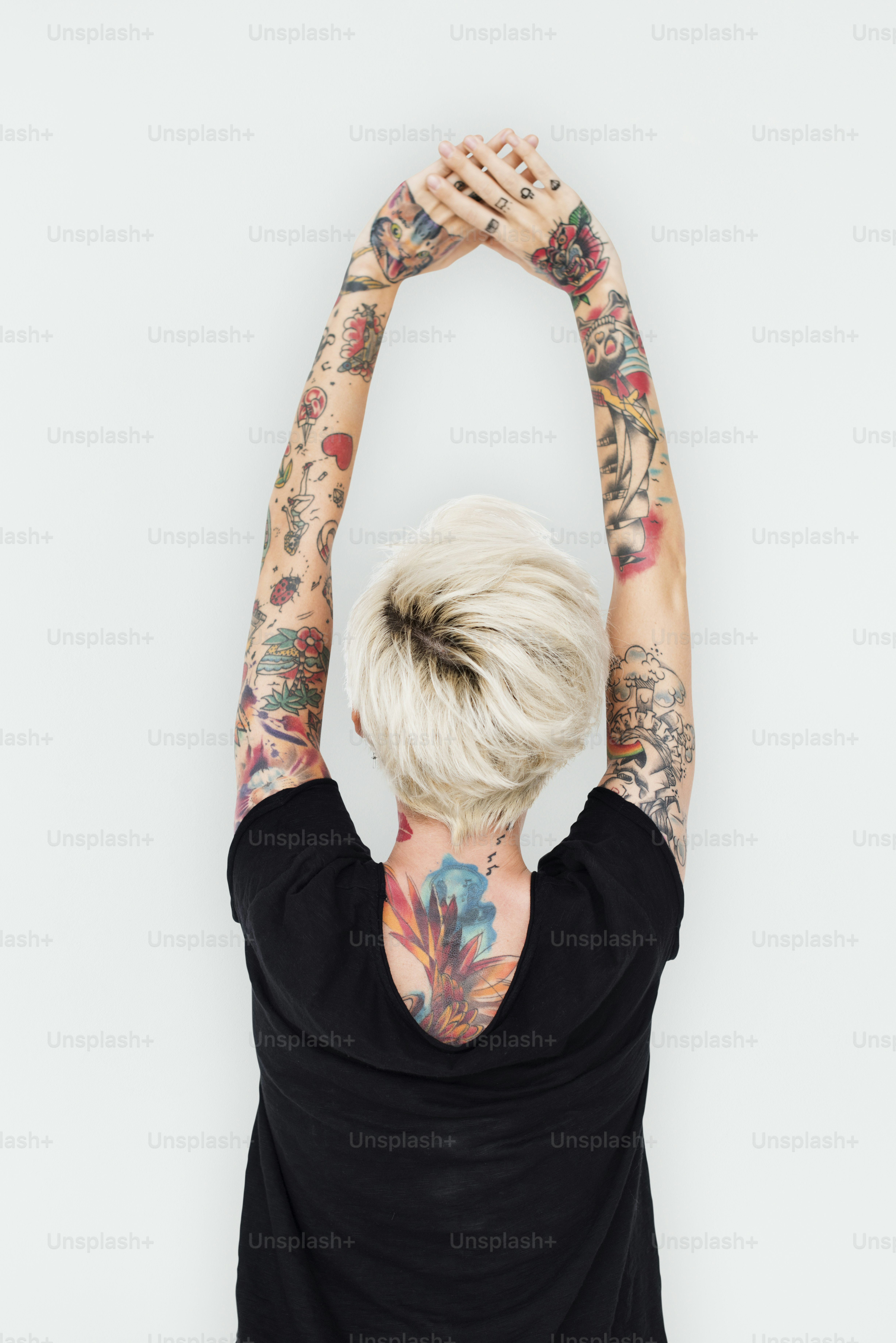 Woman rear view with tattoo on white background photo – Hipster culture ...