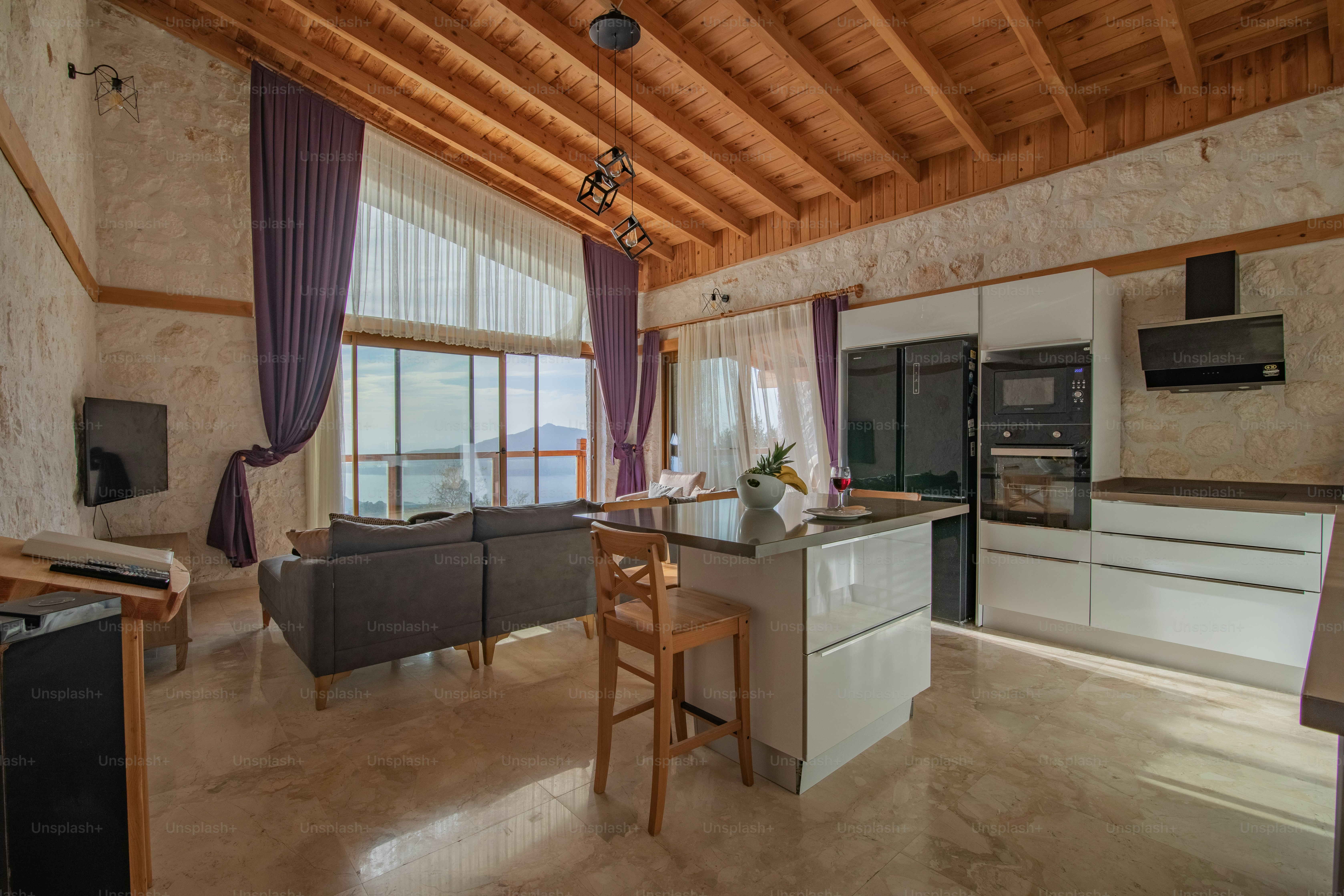 A large open kitchen and living room area photo – Beautiful house Image ...