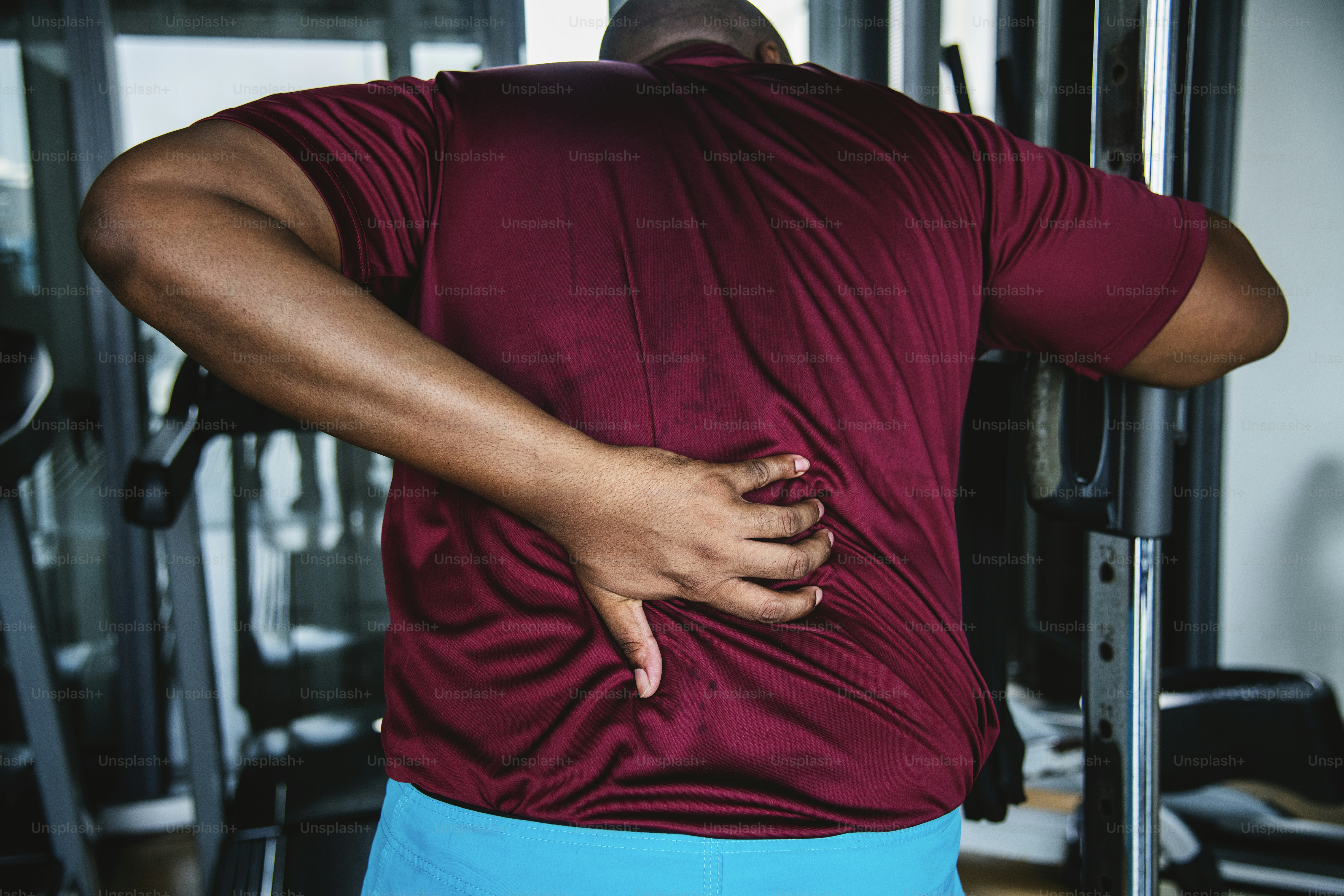Man having problems with his back photo – Black people Image on Unsplash