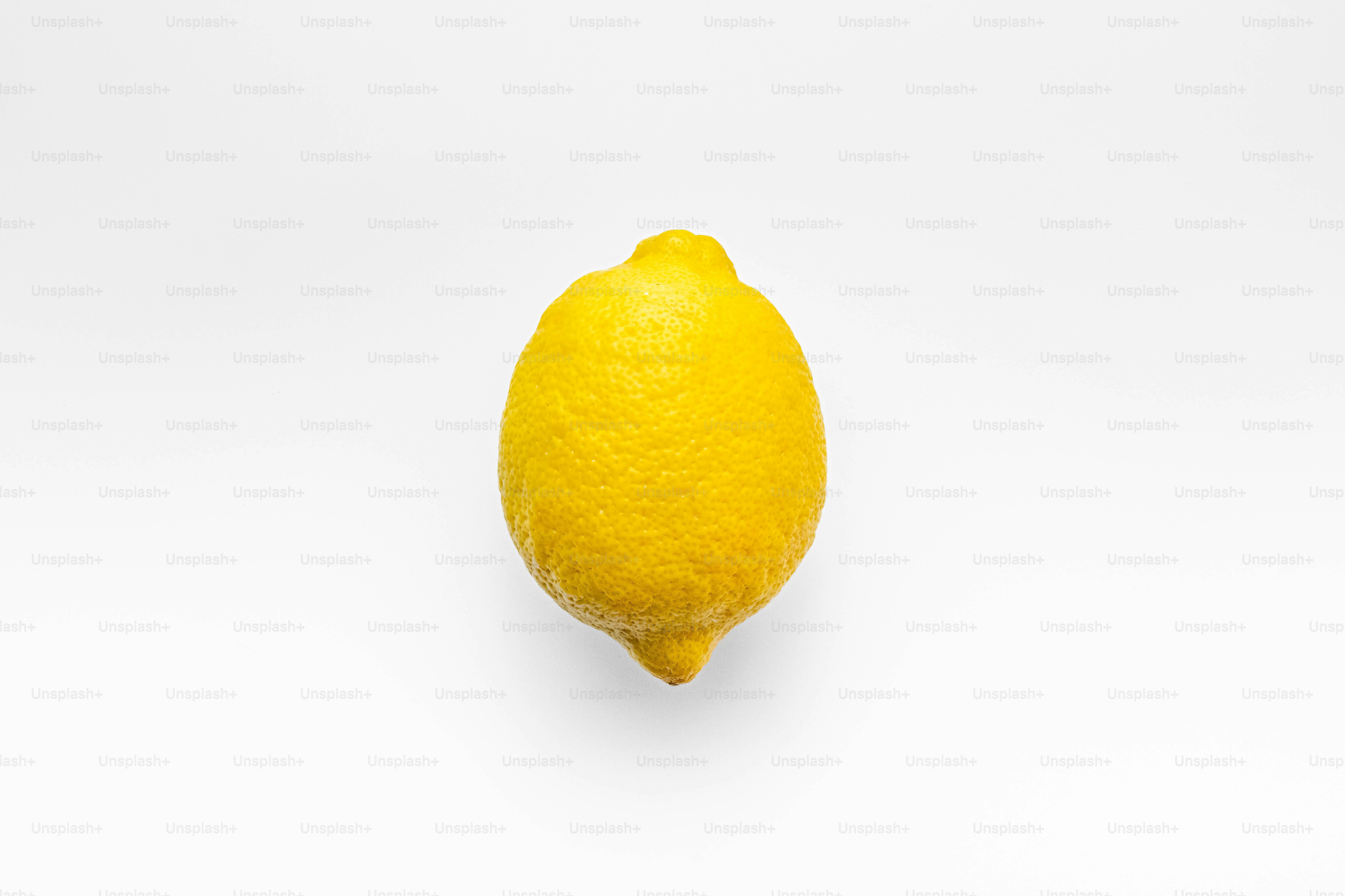 A single lemon on a white background photo – Lemon Image on Unsplash