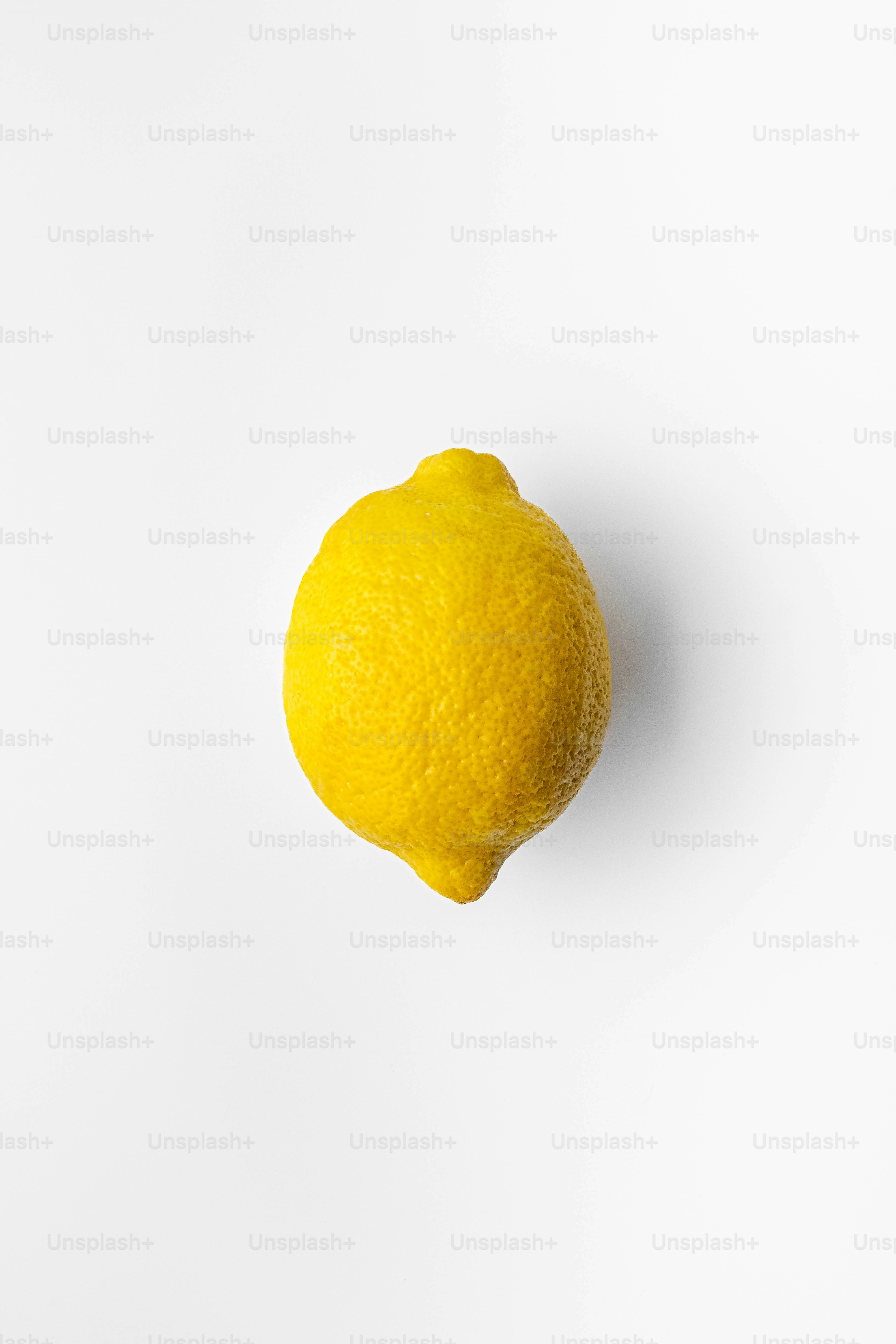 A single lemon on a white background photo – Lemon Image on Unsplash