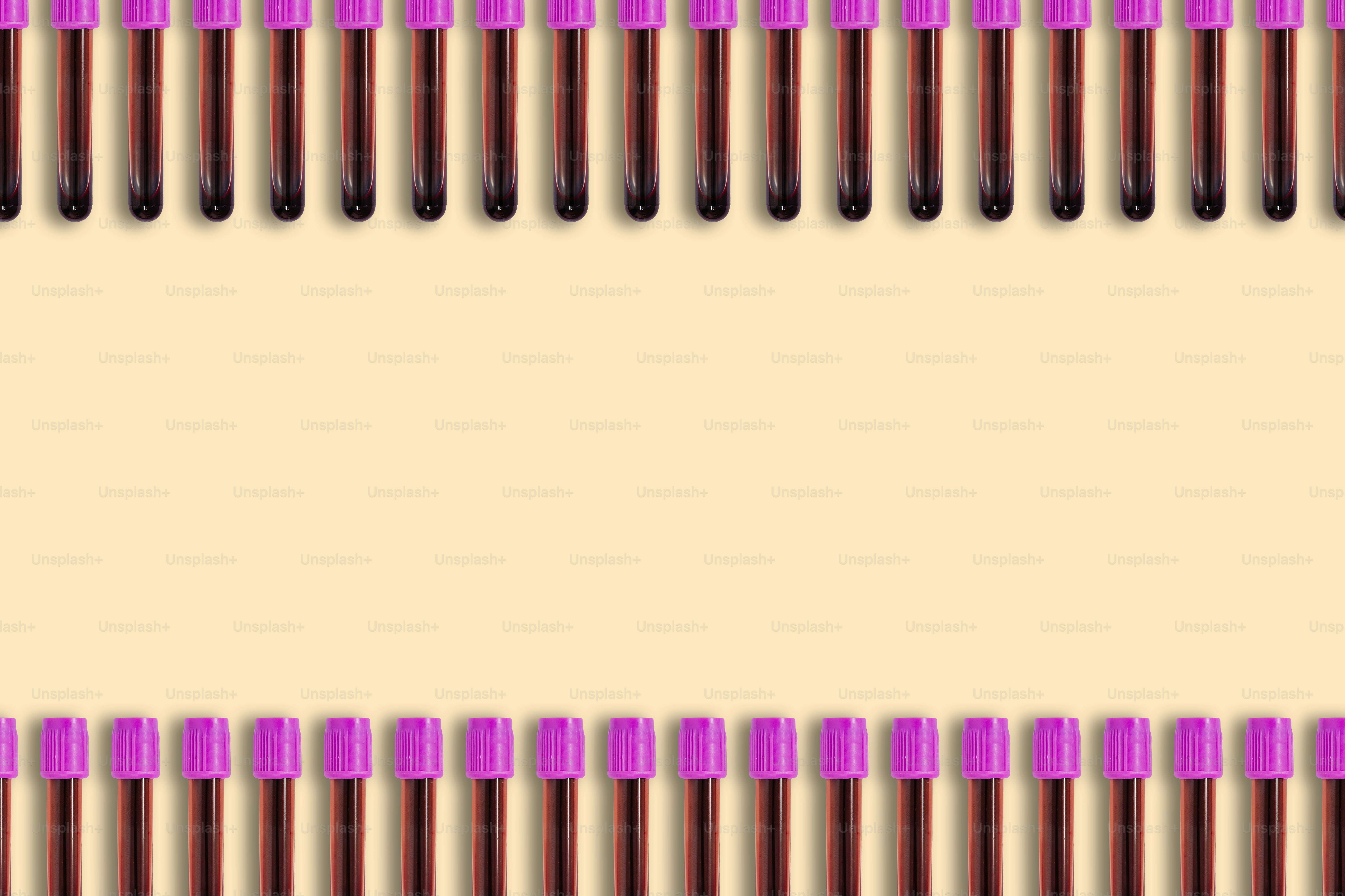 A group of pink crayons lined up in a row photo – Blood Image on Unsplash