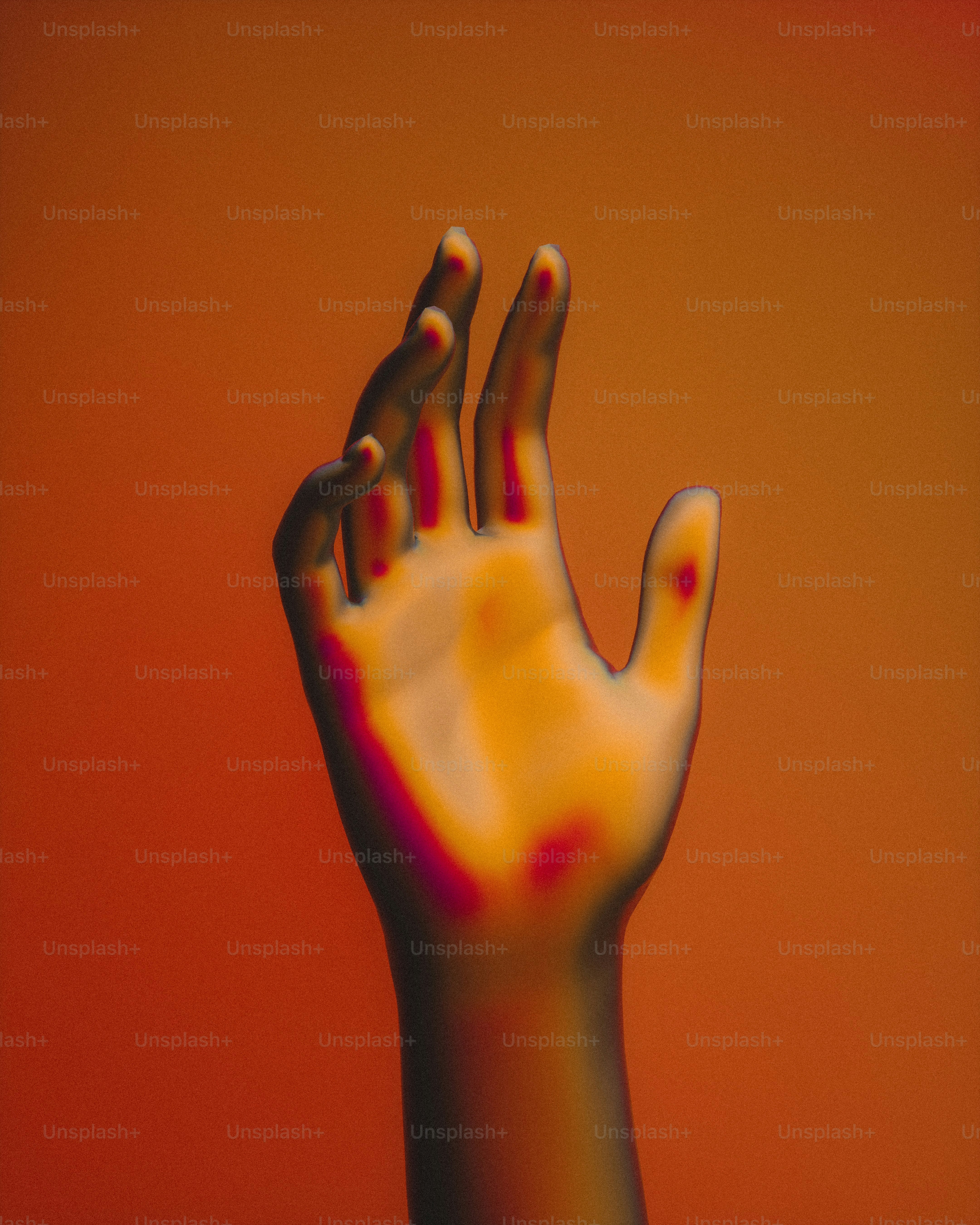 A hand reaching up into the air with an orange background photo – 3d ...