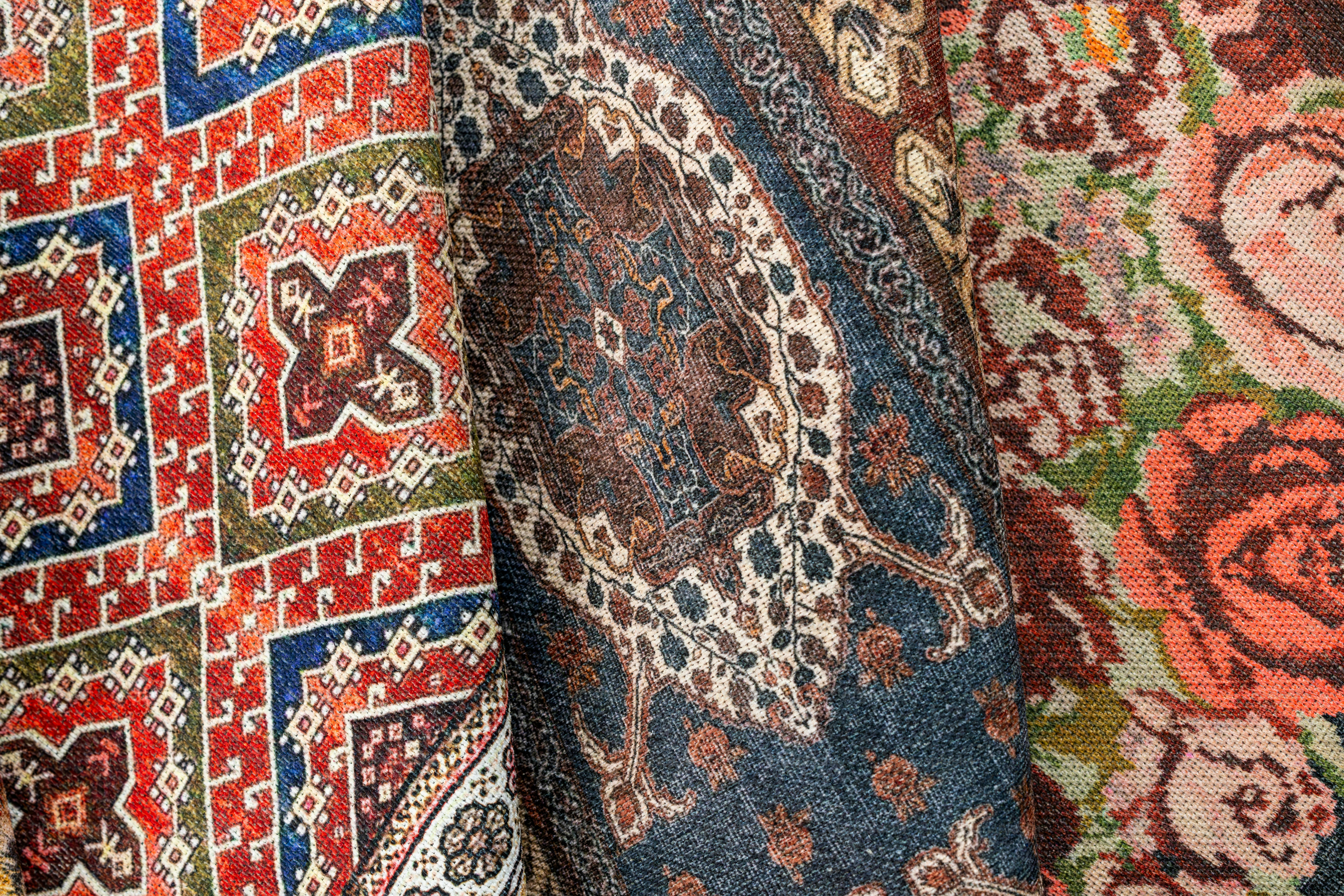 A close up of a variety of rugs photo – Rug Image on Unsplash