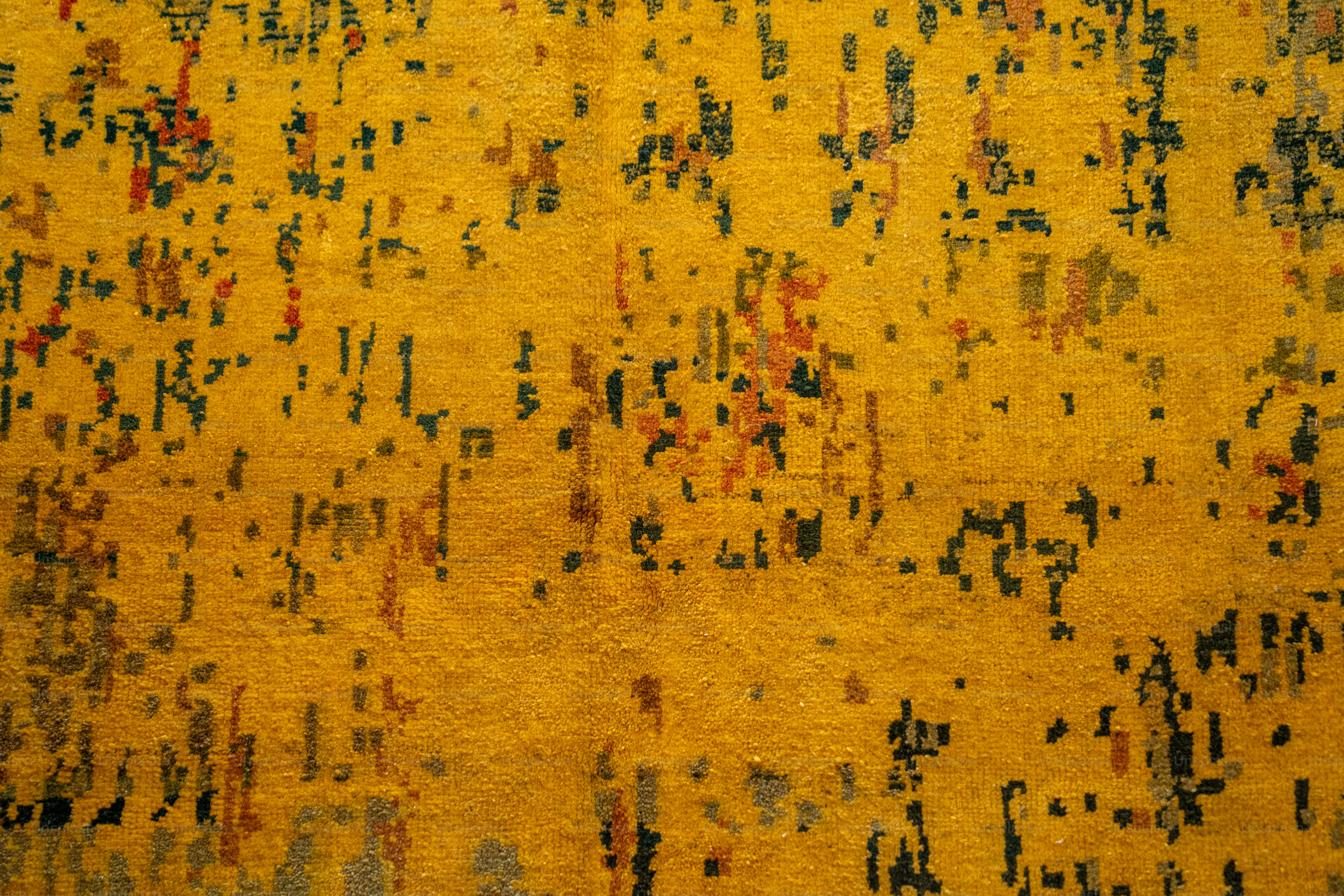 A yellow area rug with a pattern on it photo – Woven design Image on ...