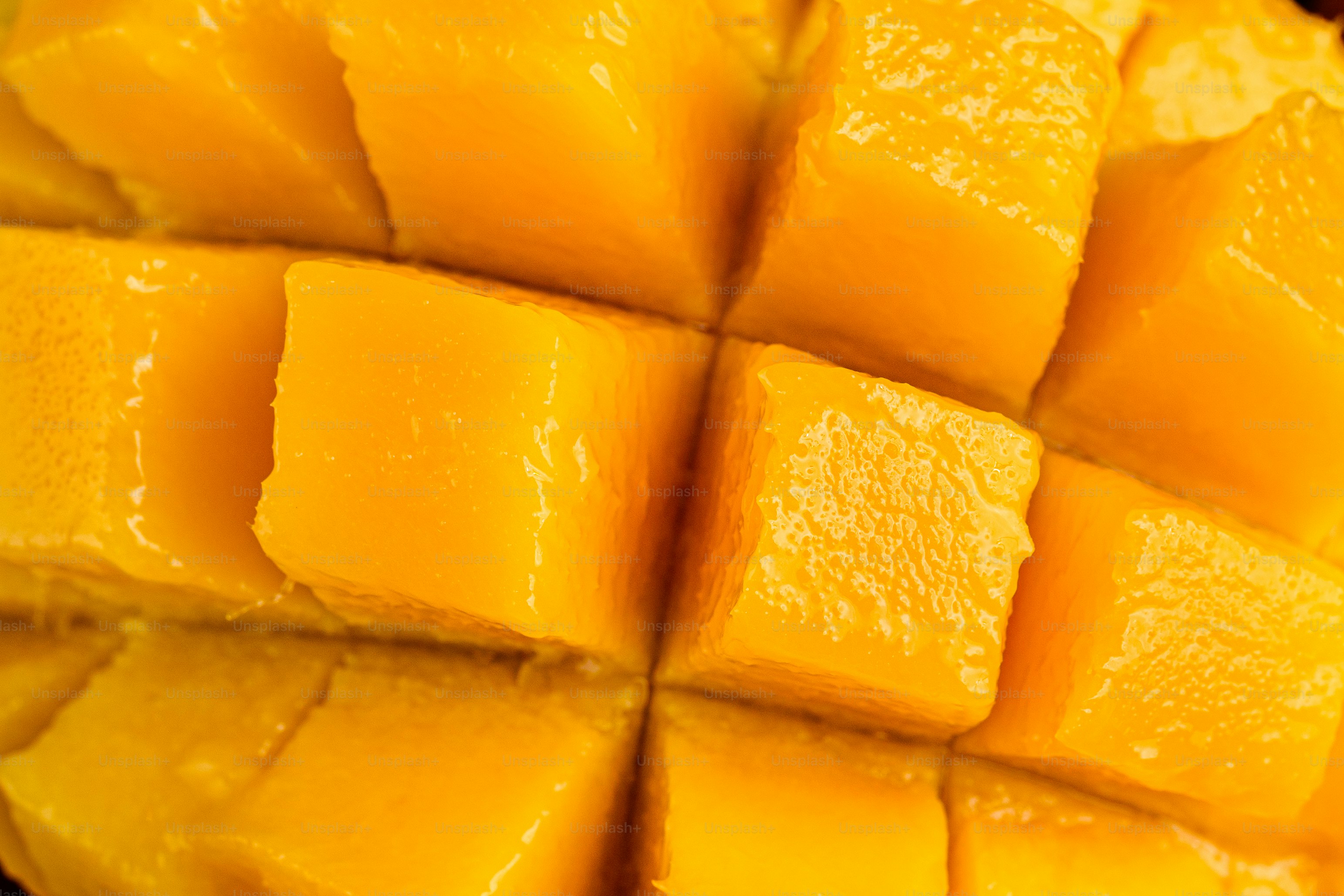 A sliced up mango sitting on top of a table photo – Food Image on Unsplash