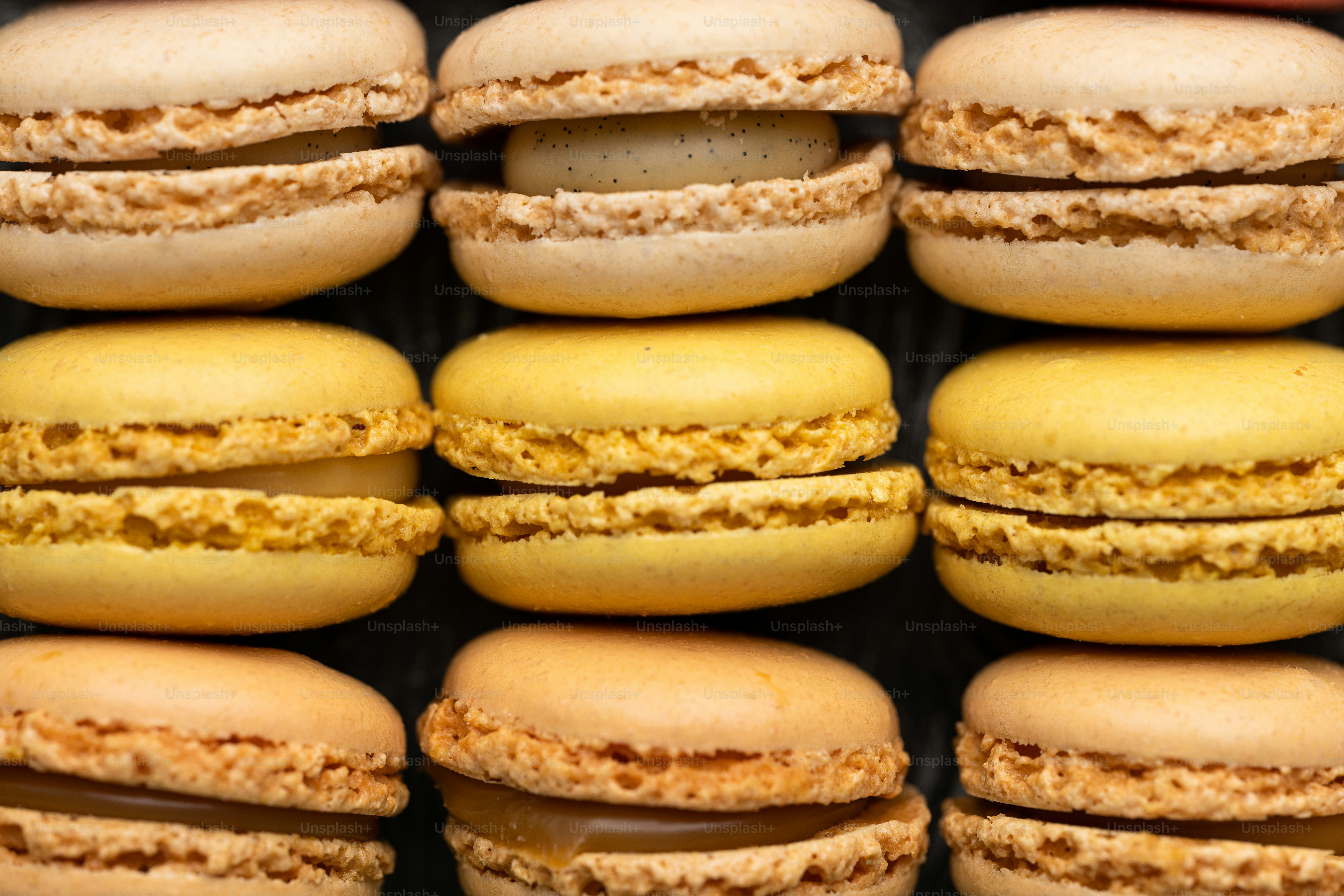 A bunch of macaroons that are stacked on top of each other photo – Food ...